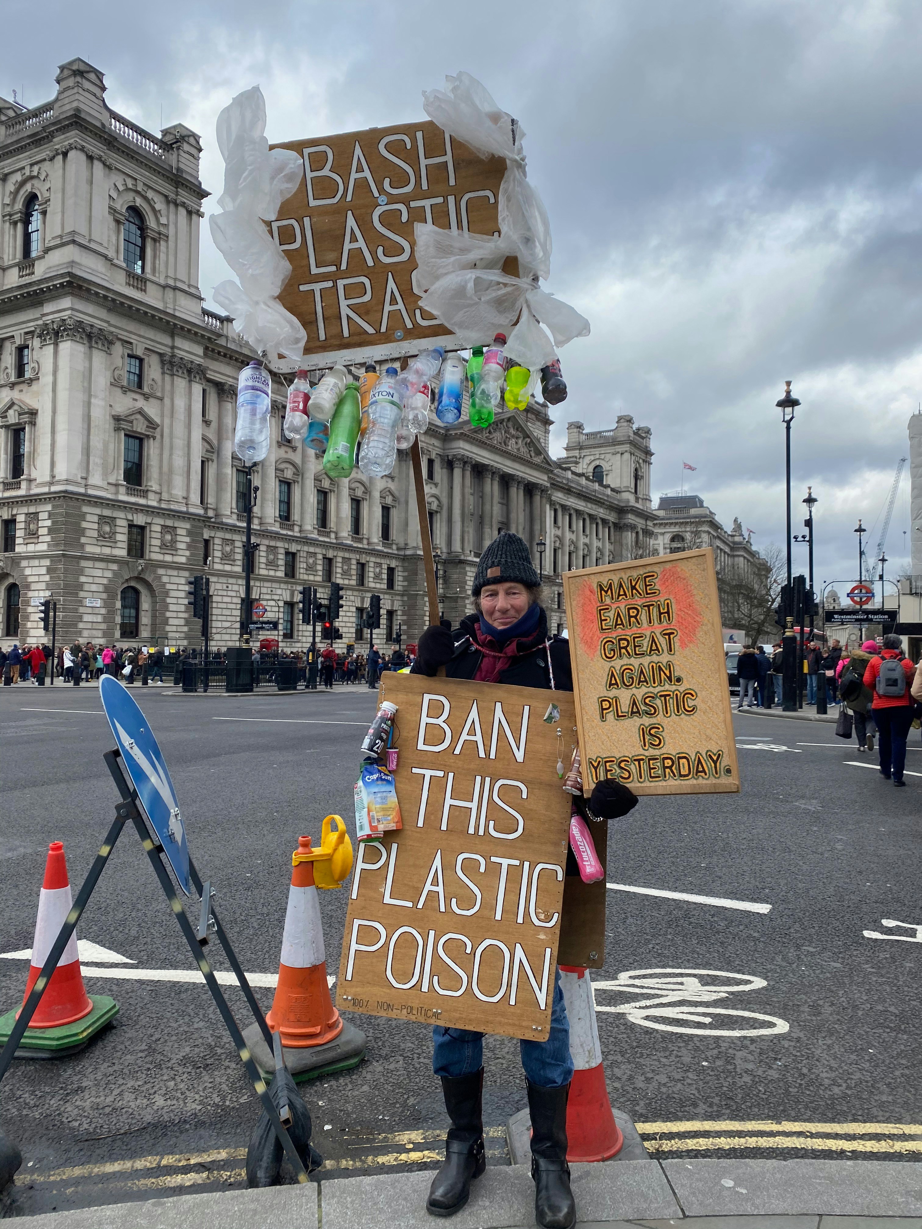Ban Plastic - Man with holding on London road mid shot