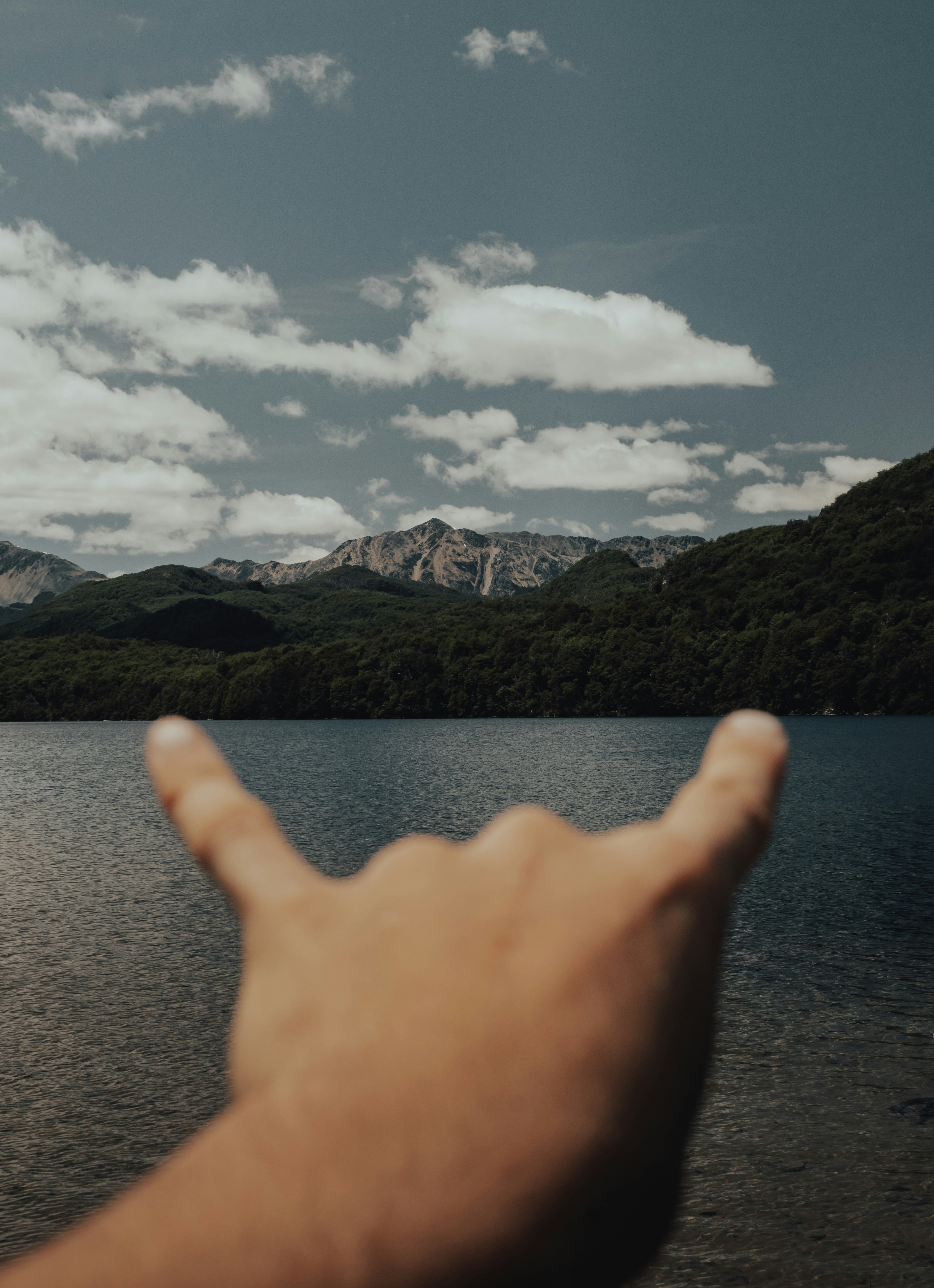 Gesture Against the Lake: Framing a Mountain Backdrop