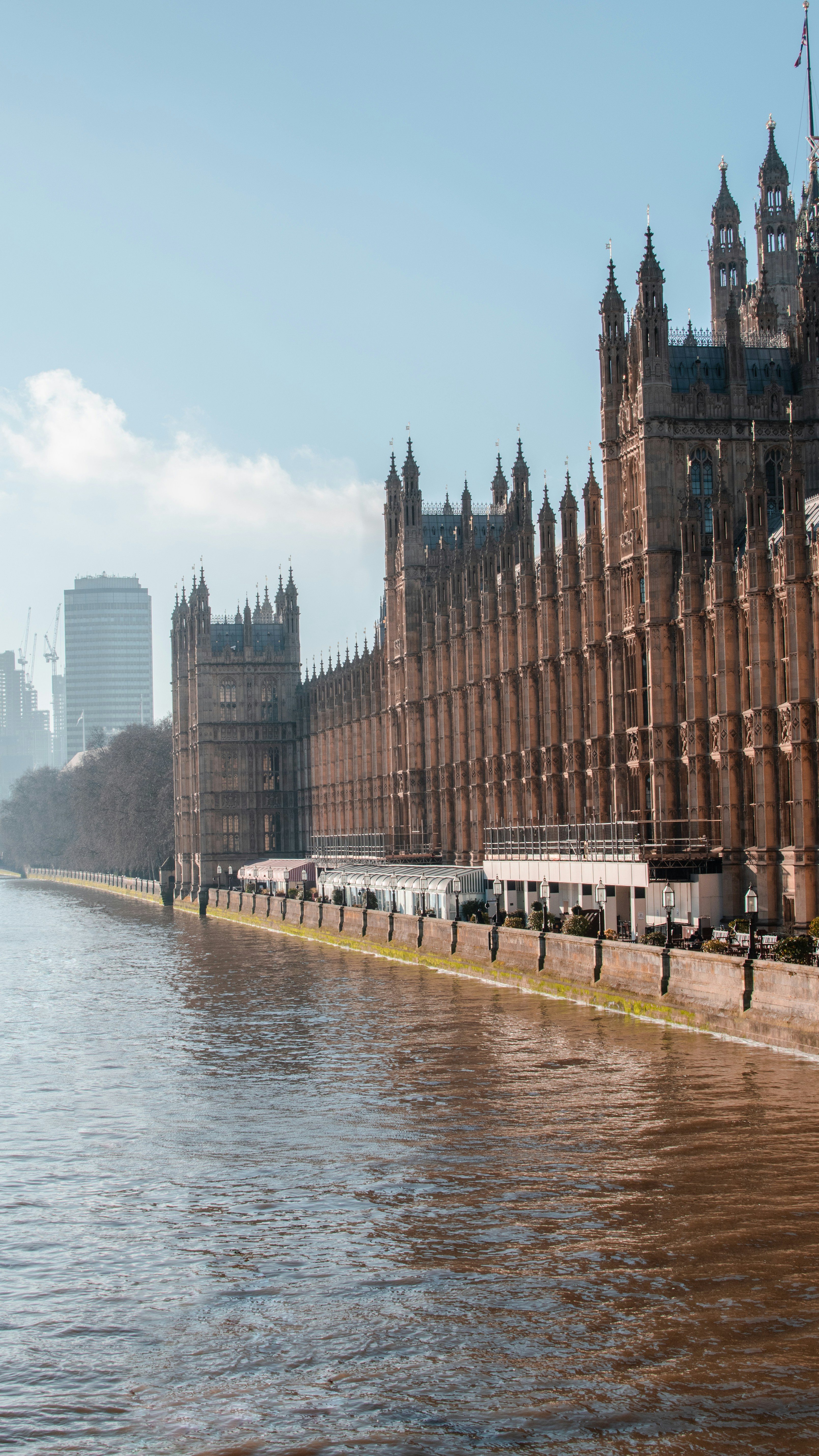Thamesfront Gothic: Parliament's Spires Against a Clear Morning Sky