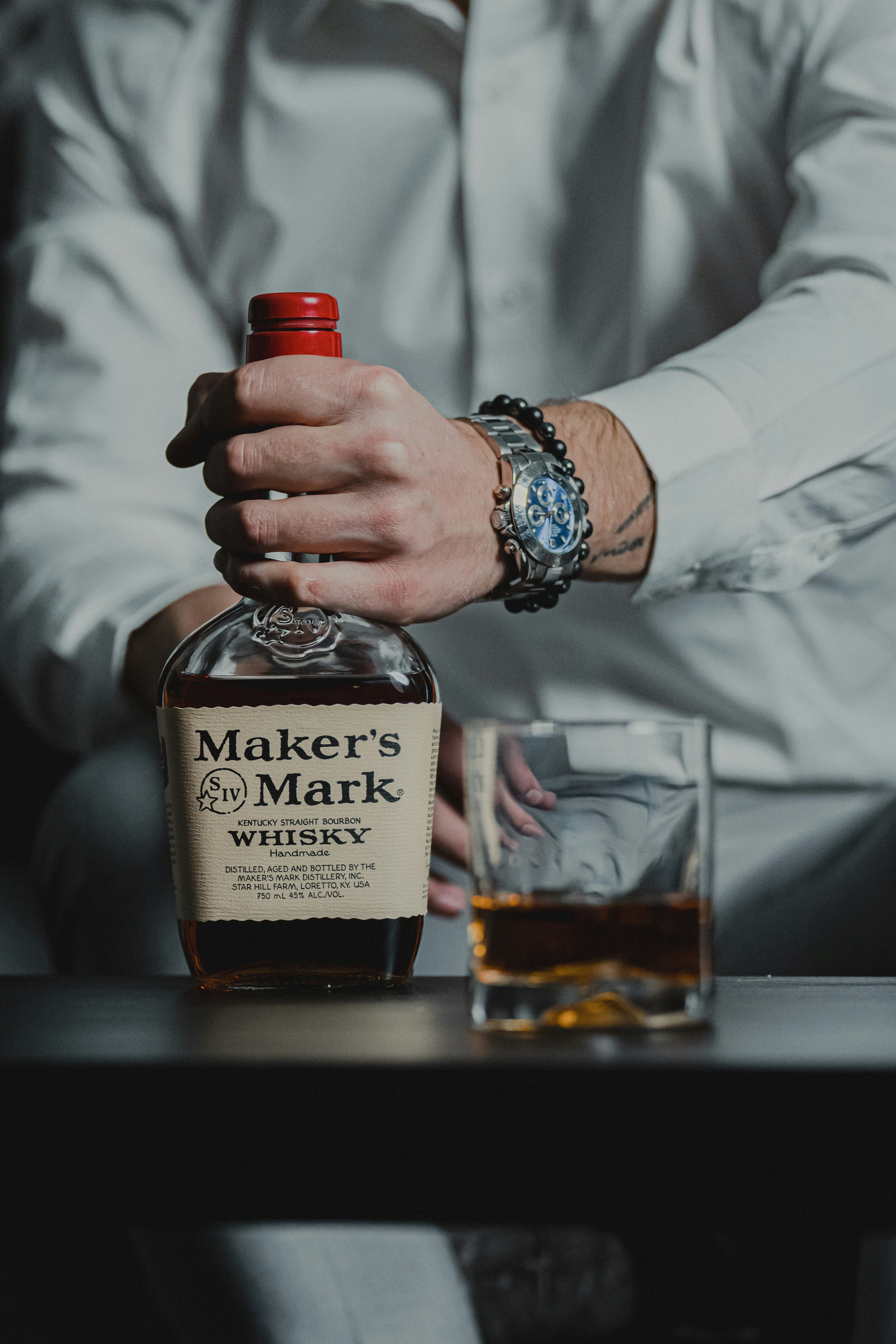 Person holding jack daniels bottle photo – Free Grey Image on Unsplash