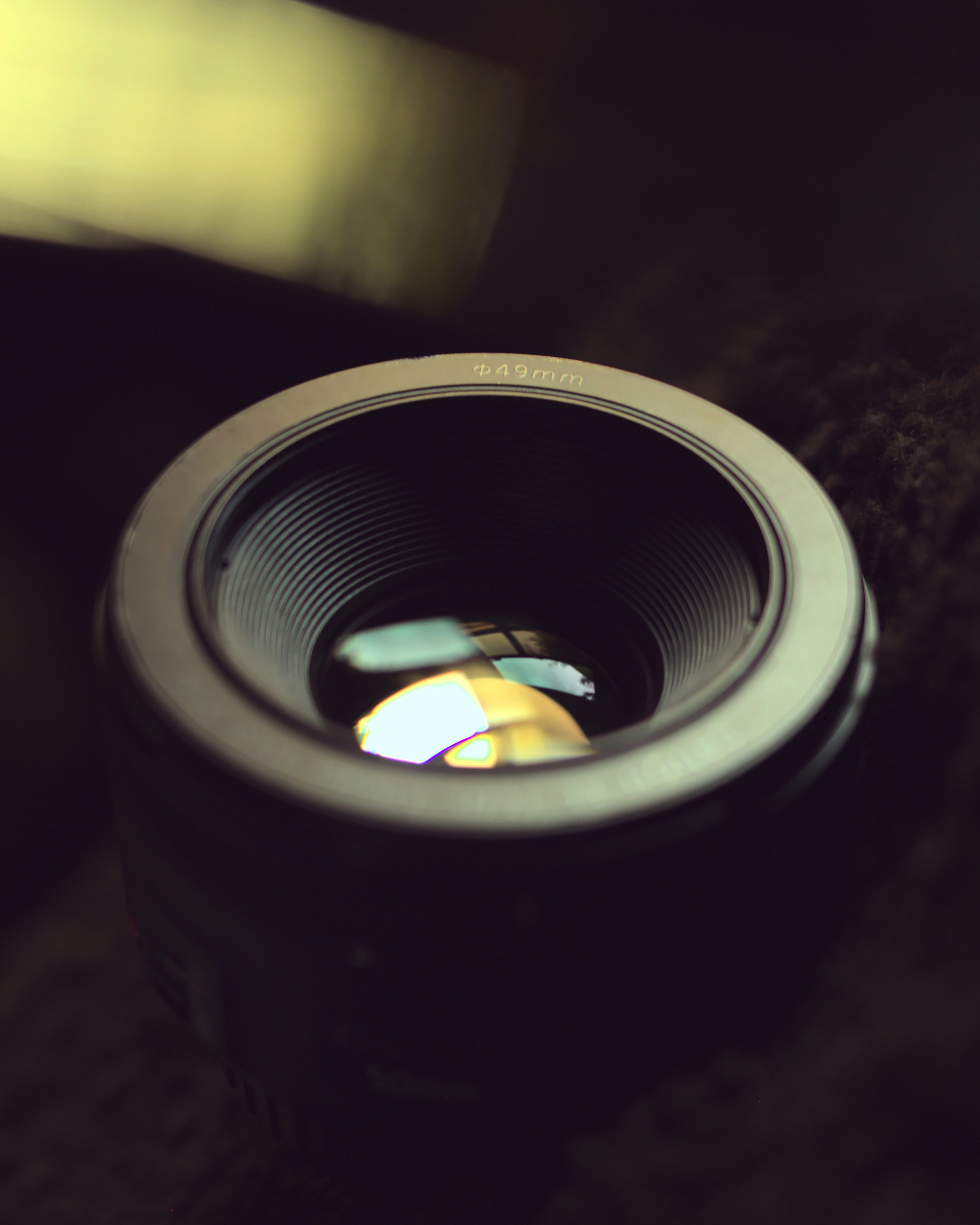 Black camera lens on brown textile photo – Free Camera lens Image on ...