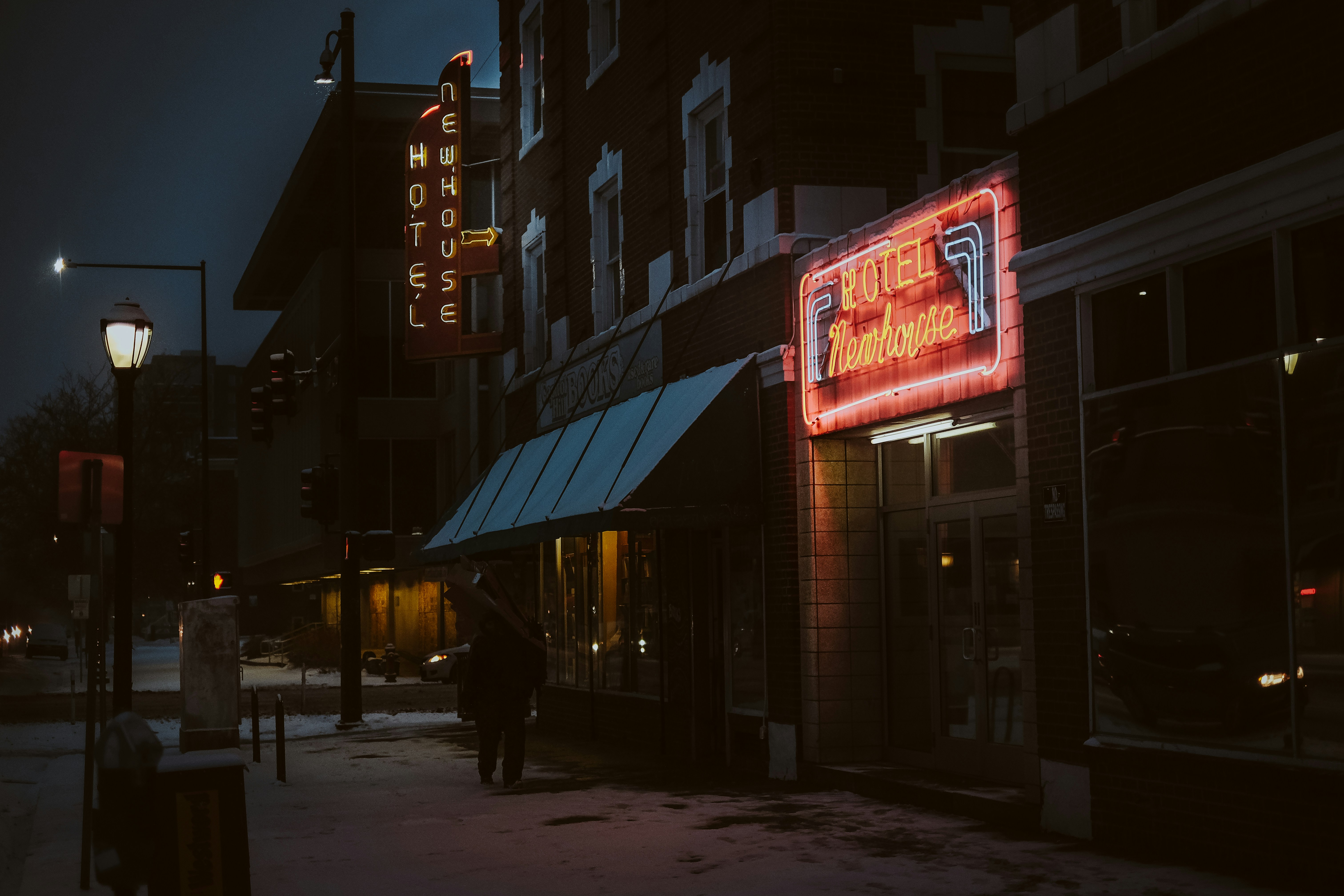 Neon Hotel Glow on a Snow-Dusted Street