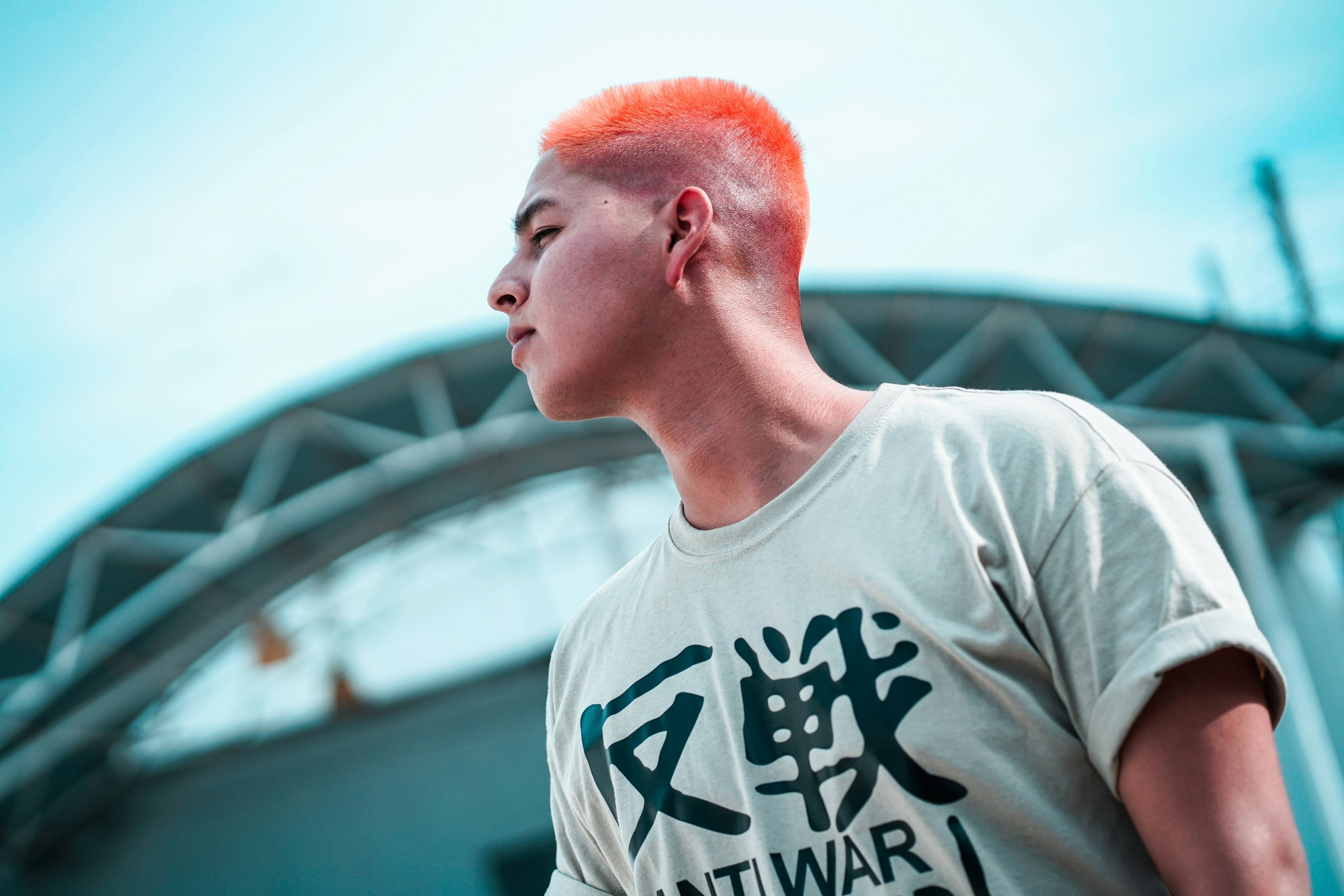 Neon-toned Portrait of Determination Under Urban Canopy