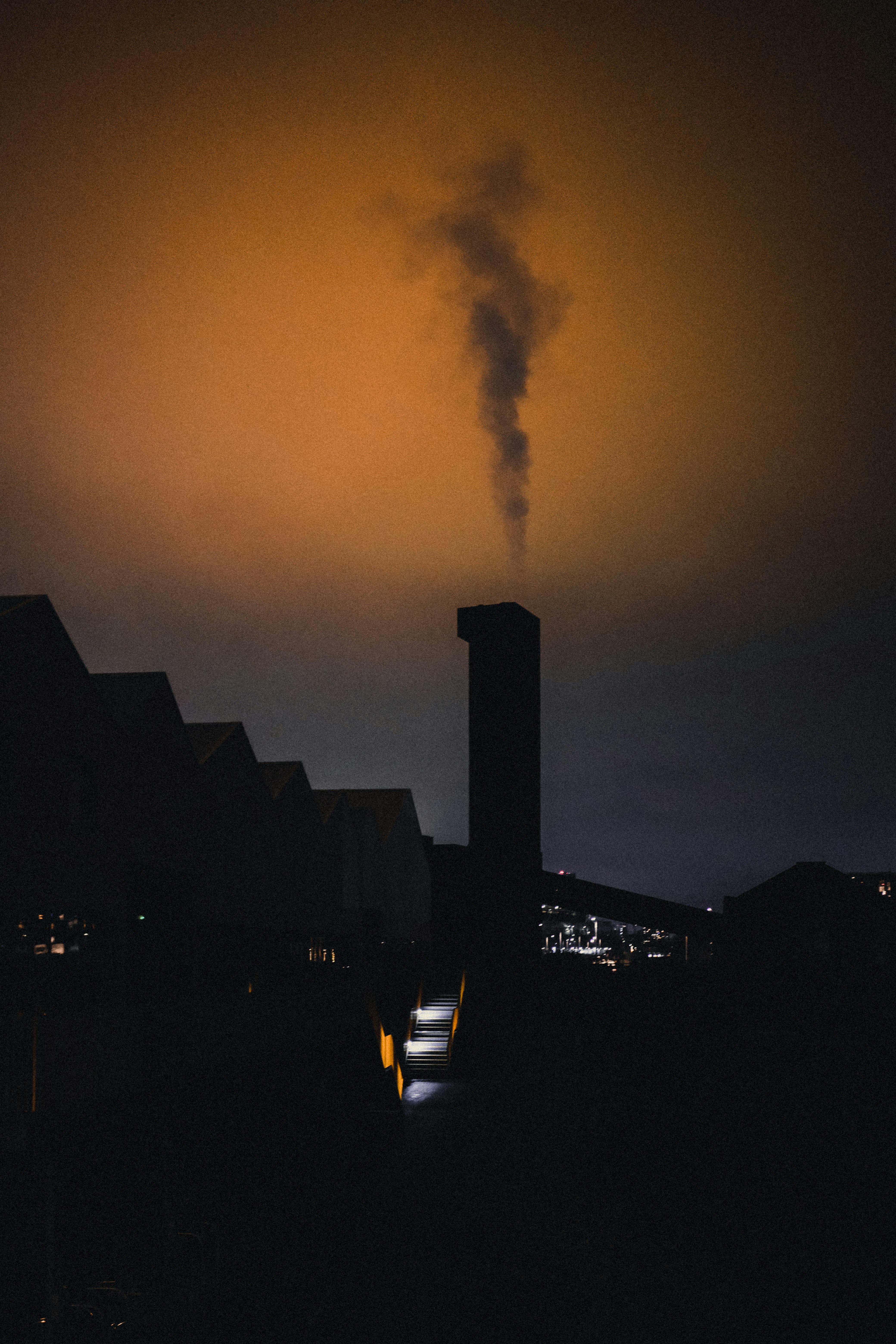 Dusk Over a Quiet Smokestack: Geometry in an Industrial Skyline