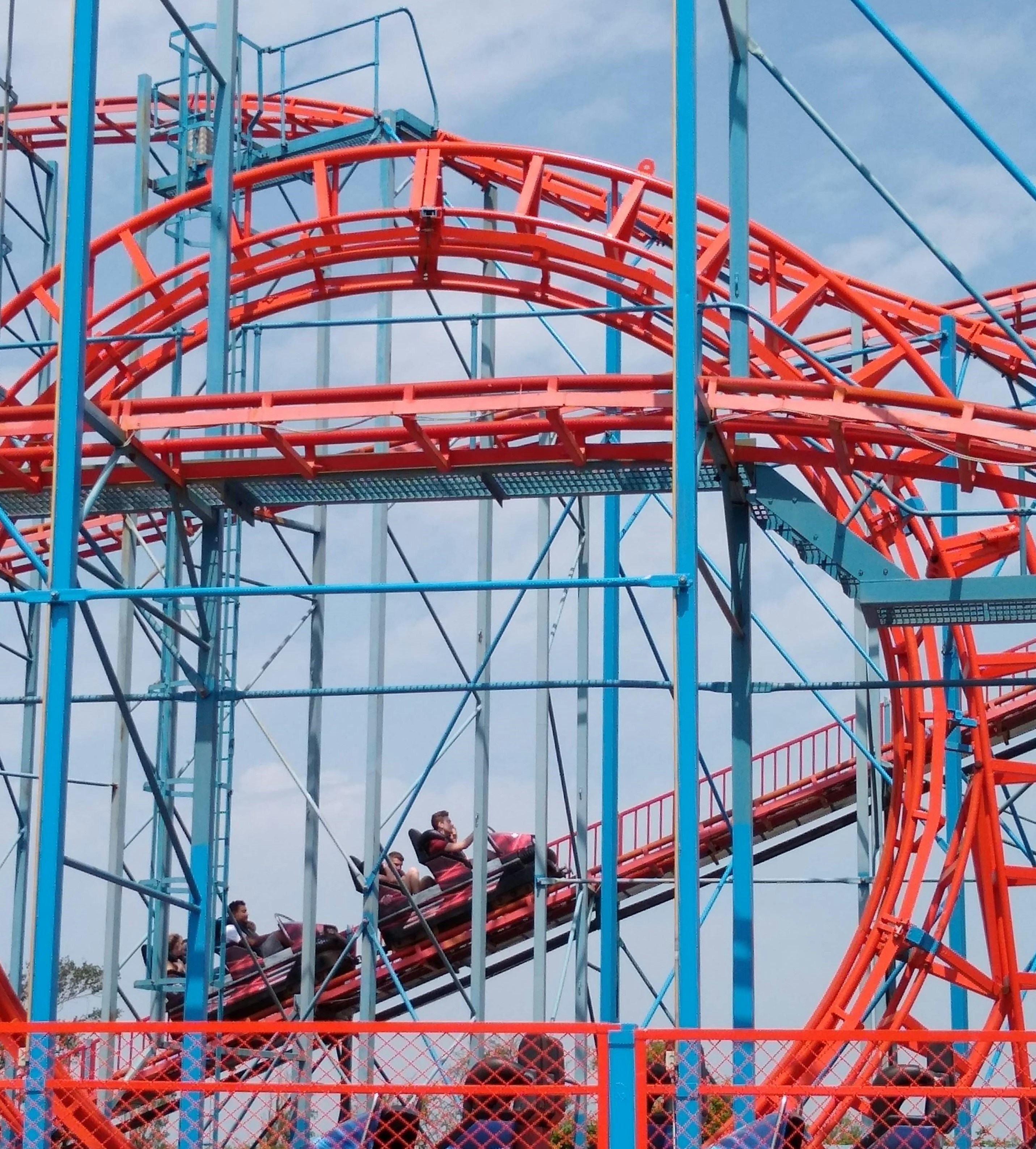 People riding roller coaster during daytime photo – Free Amusement park ...