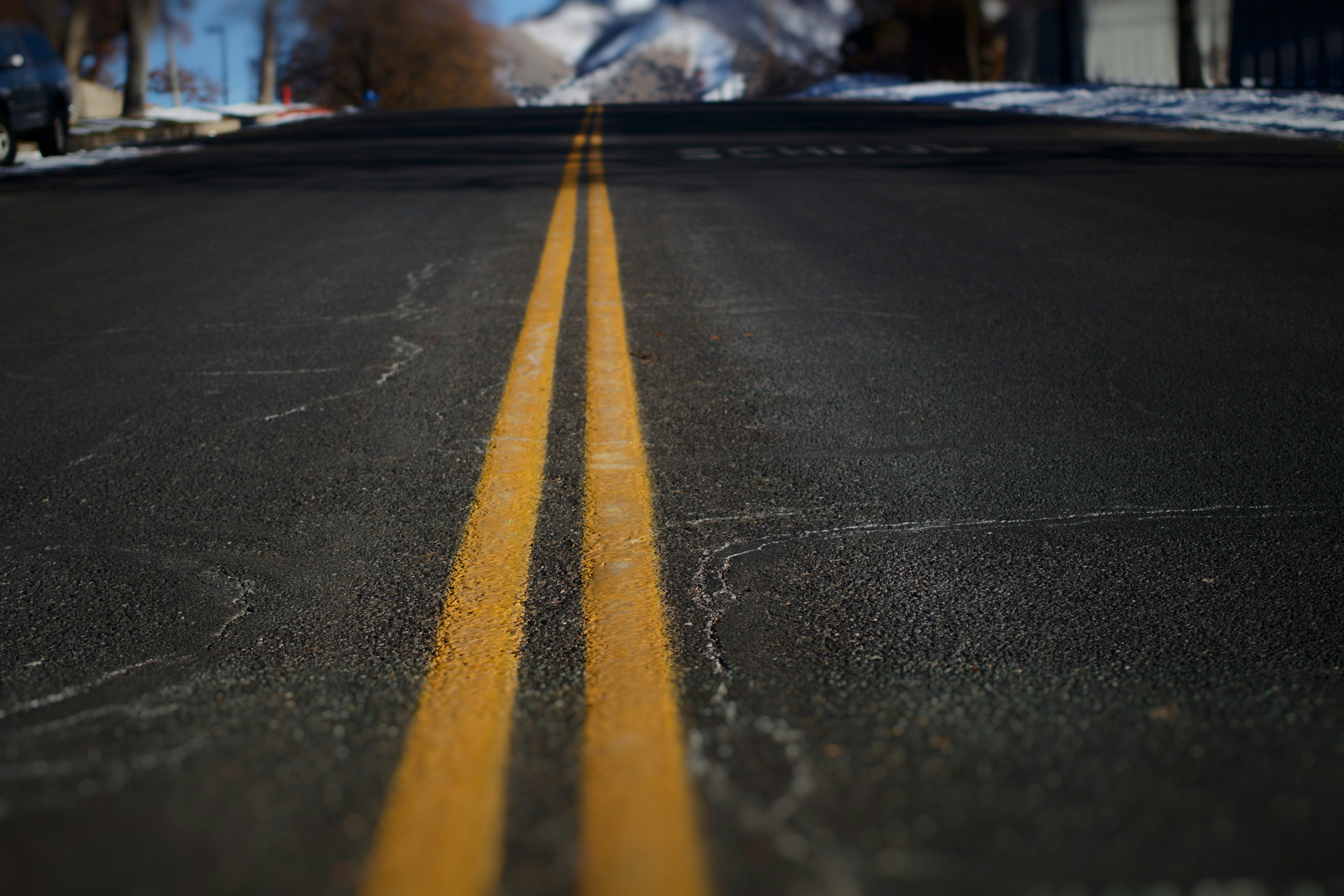 Centerline Convergence: A Quiet Mountain Street Vanishing Ahead