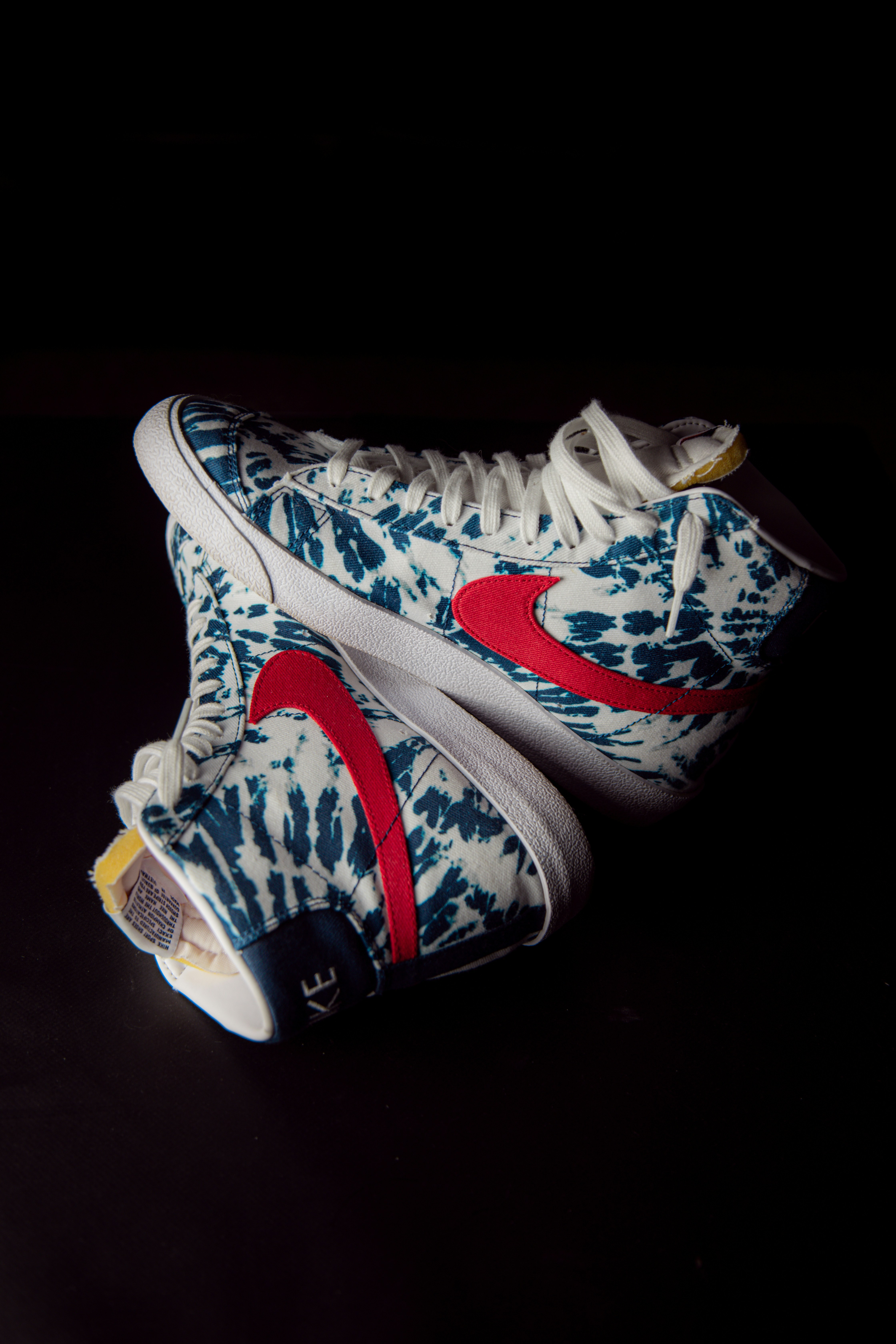 Crimson Swoosh on Tie-Dyed Kicks: A Studio Portrait