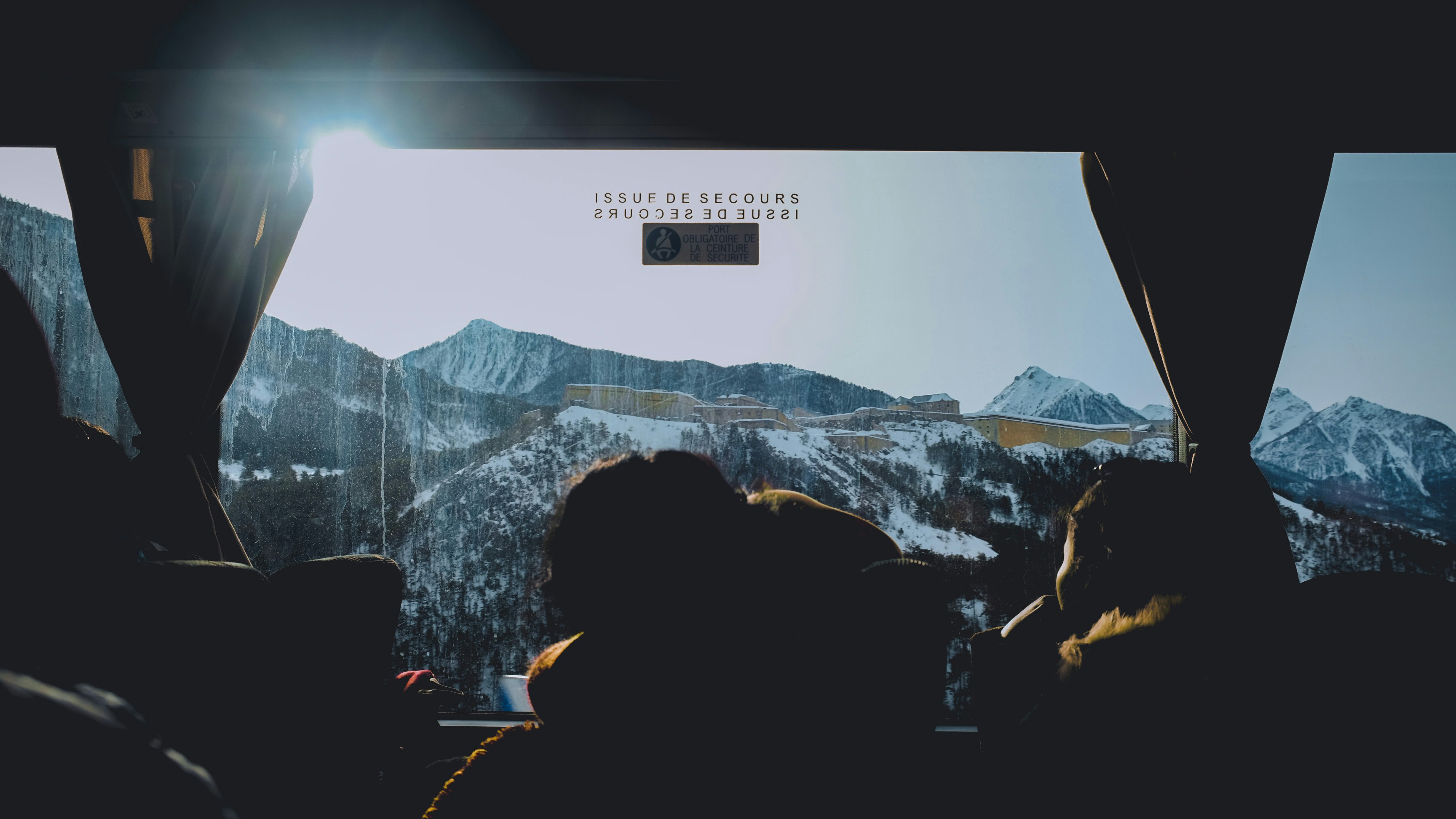 Black flat screen tv turned on displaying snow covered mountain photo ...