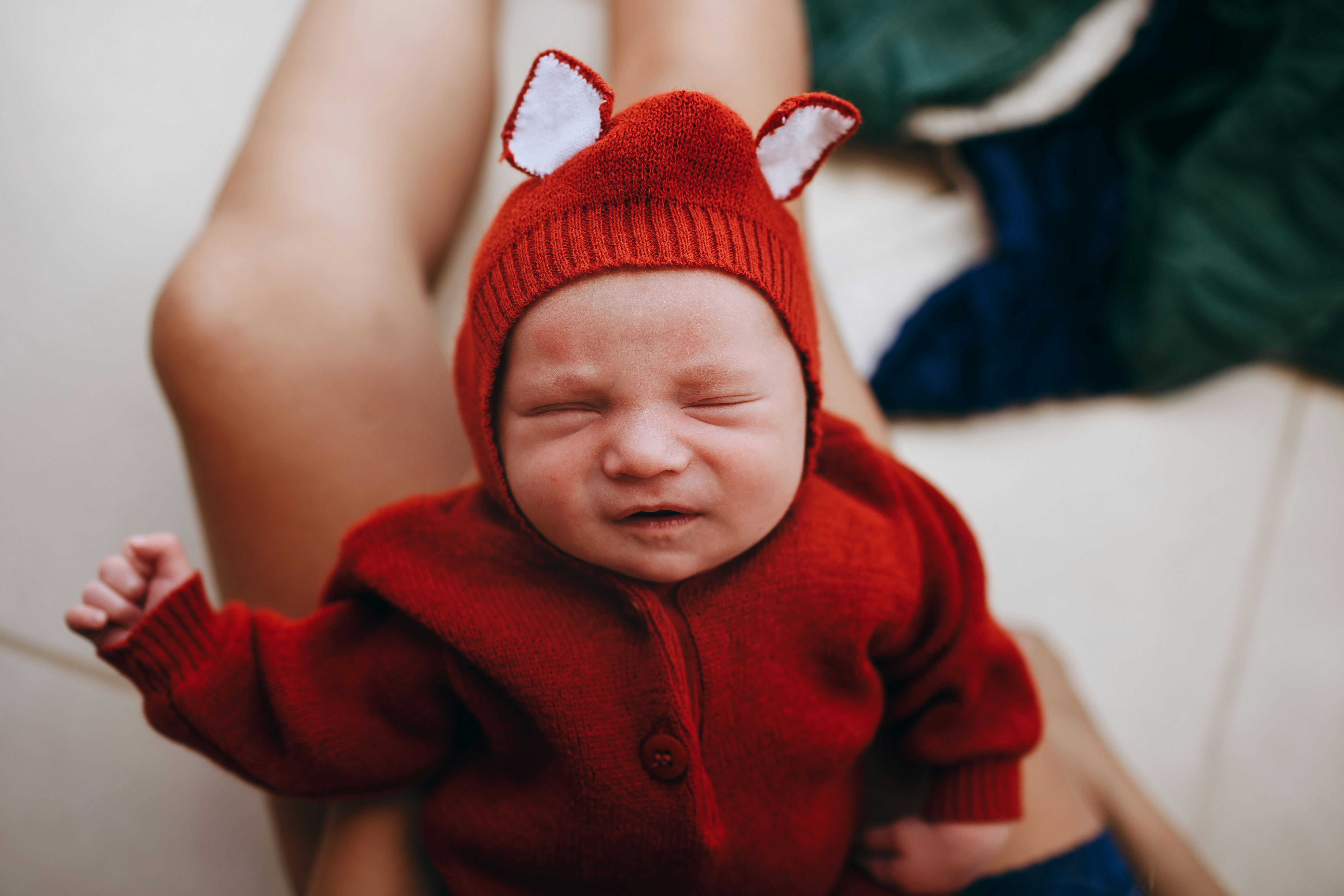 Baby in red knit cap photo – Free Human Image on Unsplash
