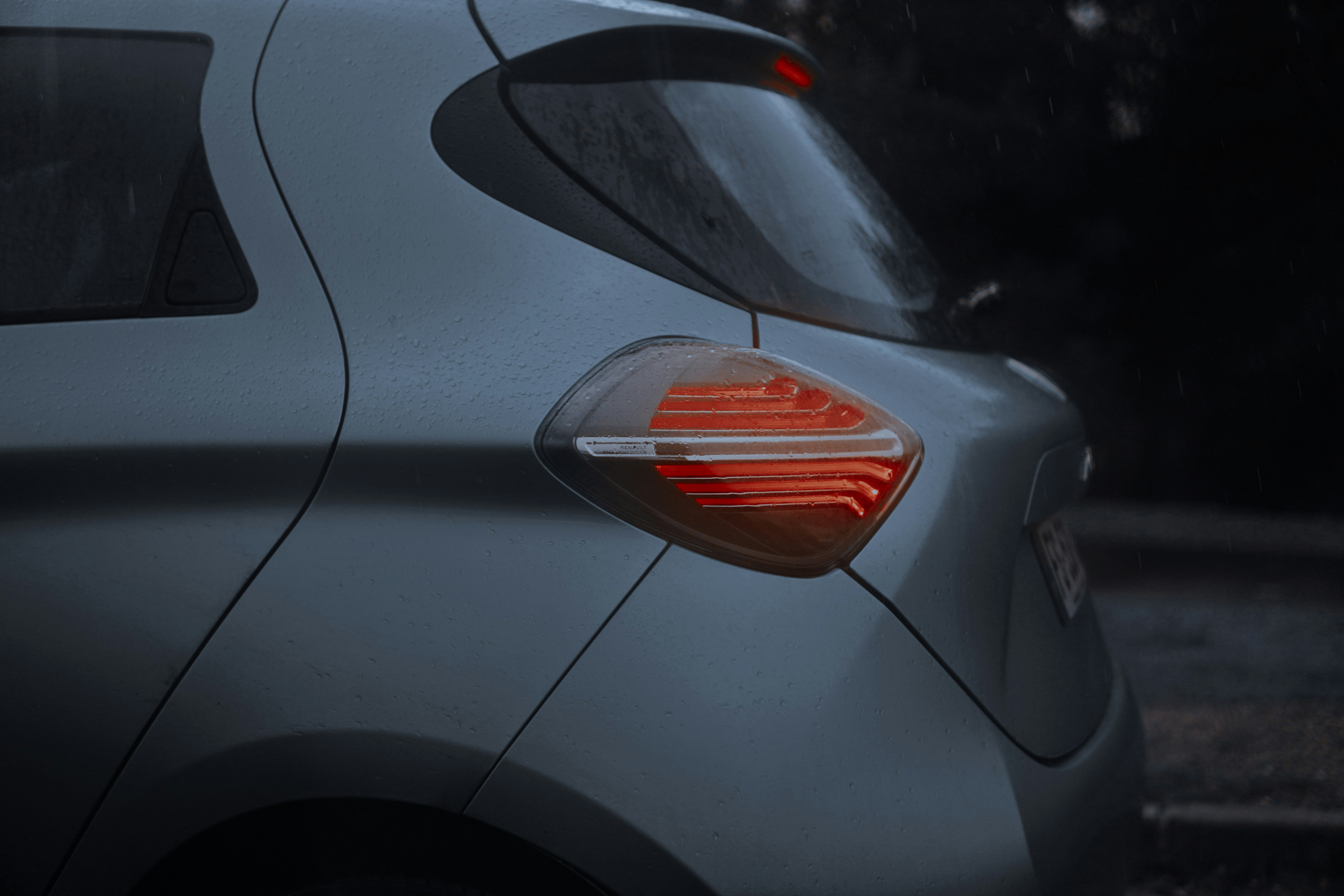 Twilight Tail Light: Quiet Momentum at the Car's Rear