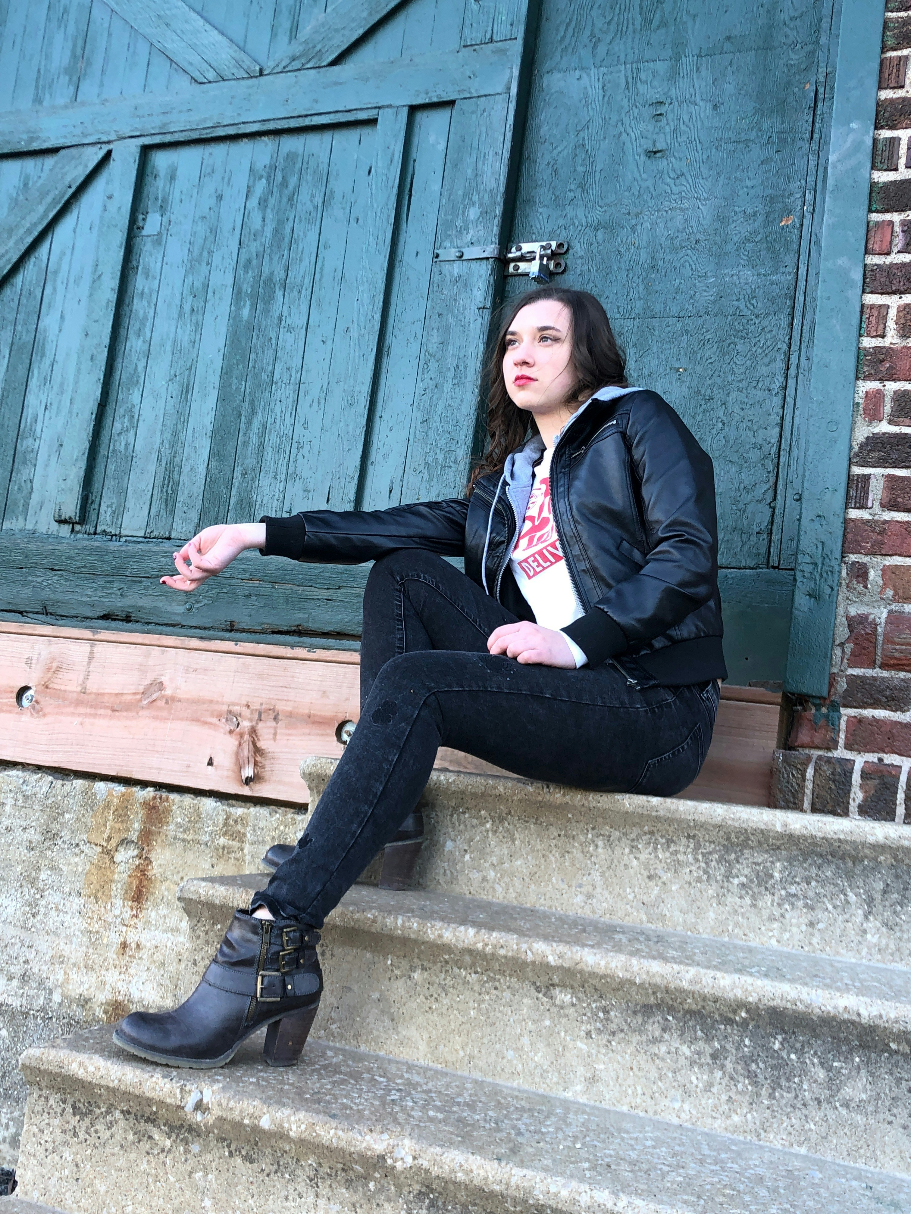 Teal Door Portrait: Quiet Confidence on Weathered Steps