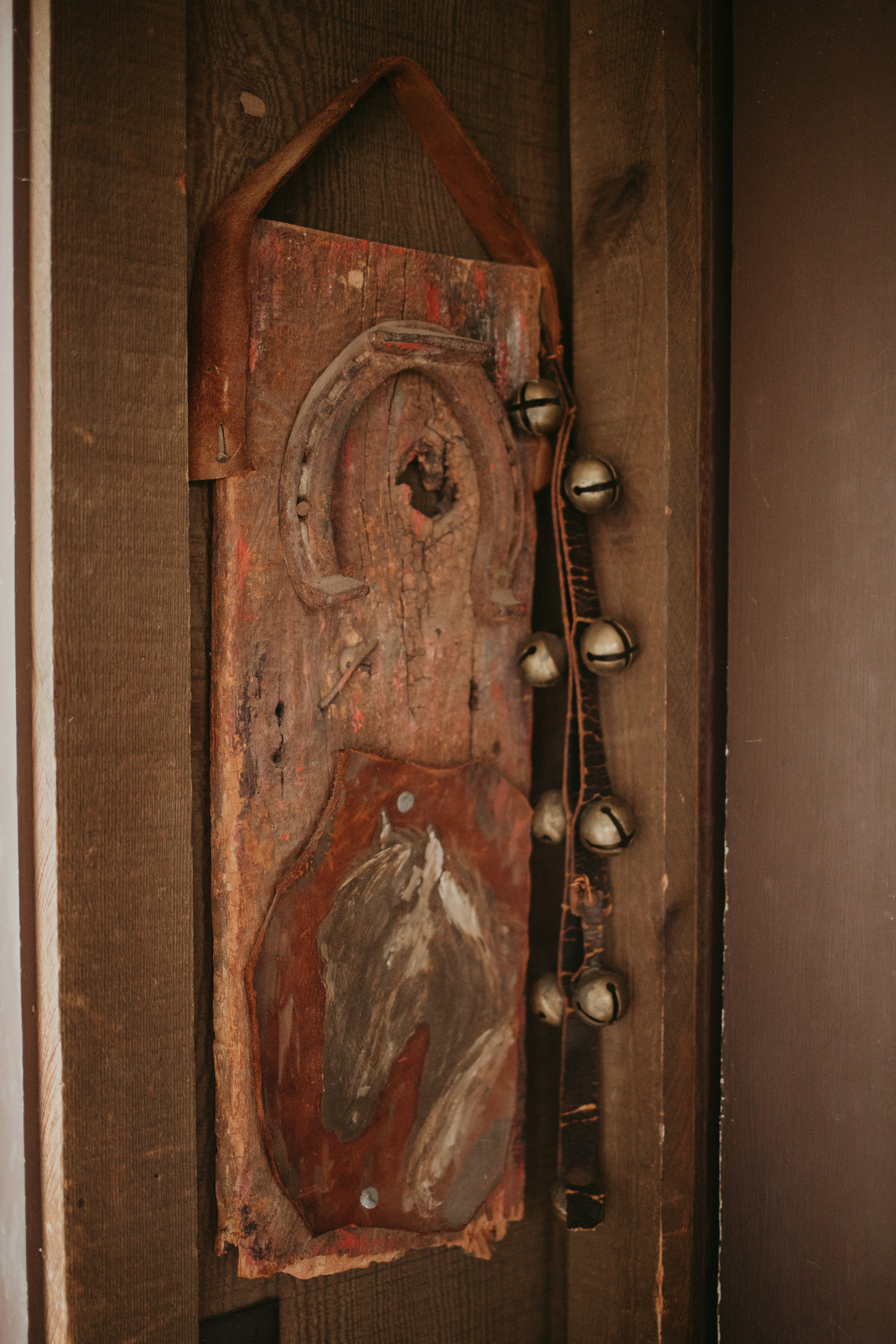 brown wooden door with silver door lever