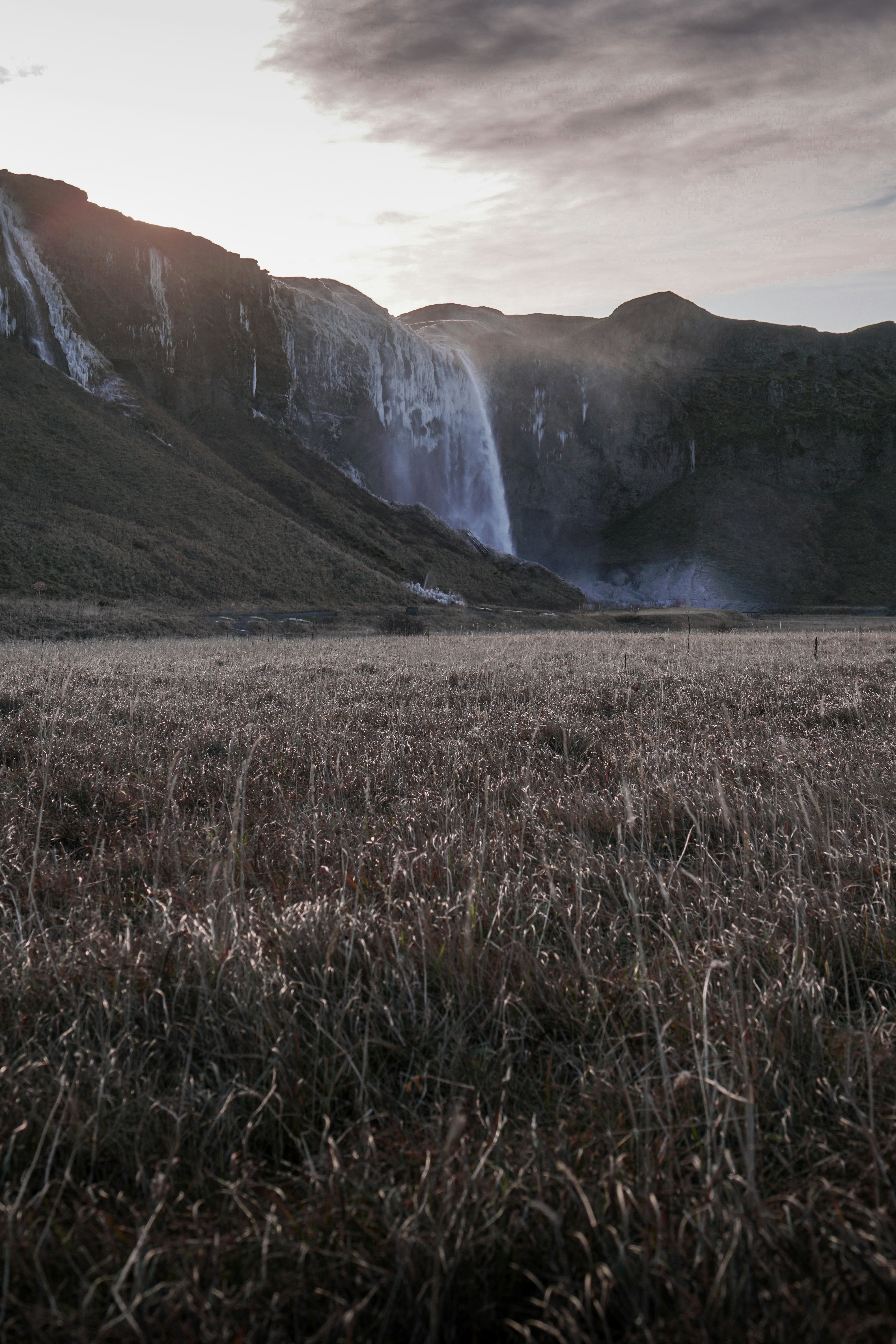 Curtain of Water Over a Quiet Prairie at Dusk