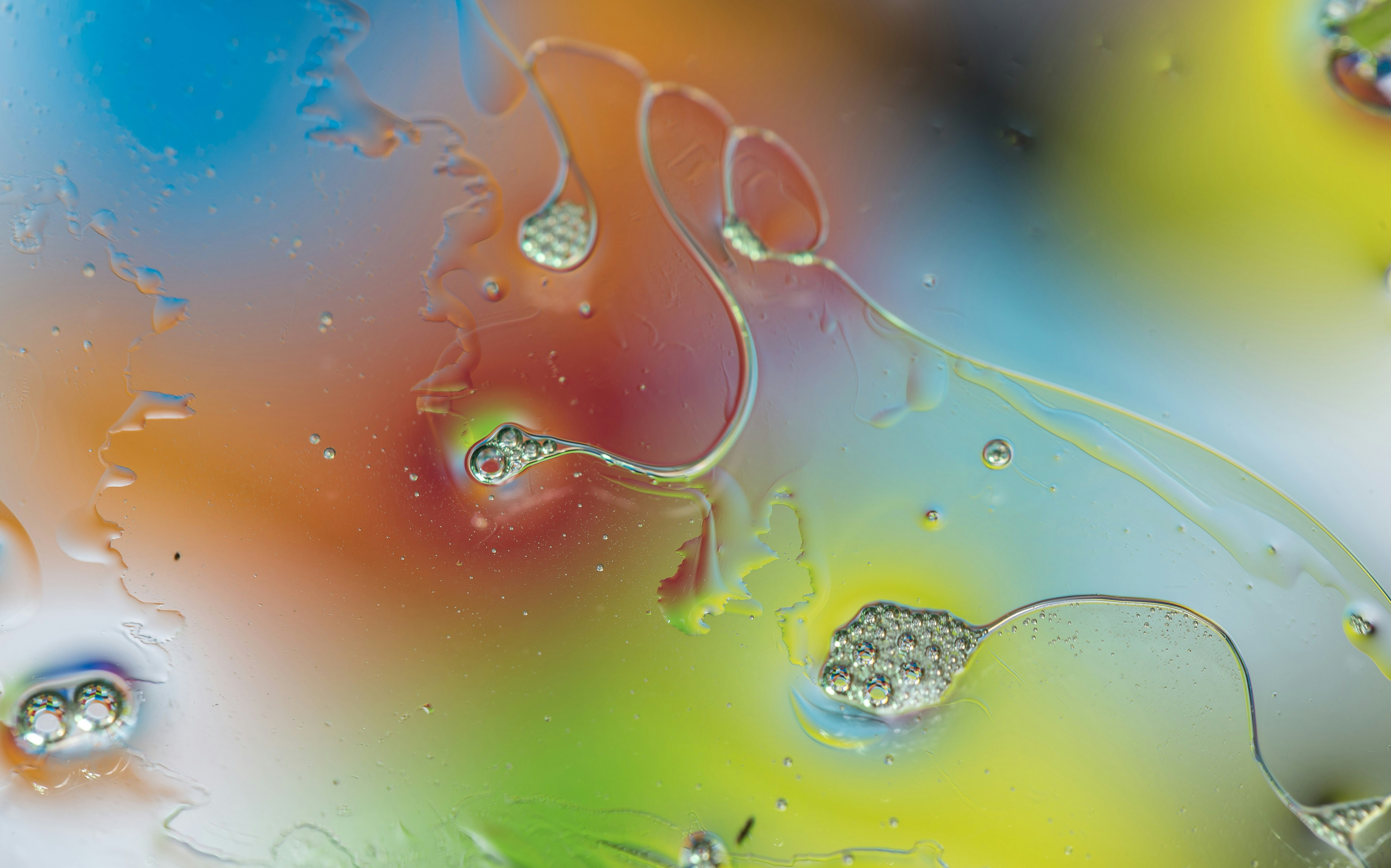 Chromatic Currents: A Macro Mosaic of Oil on Water
