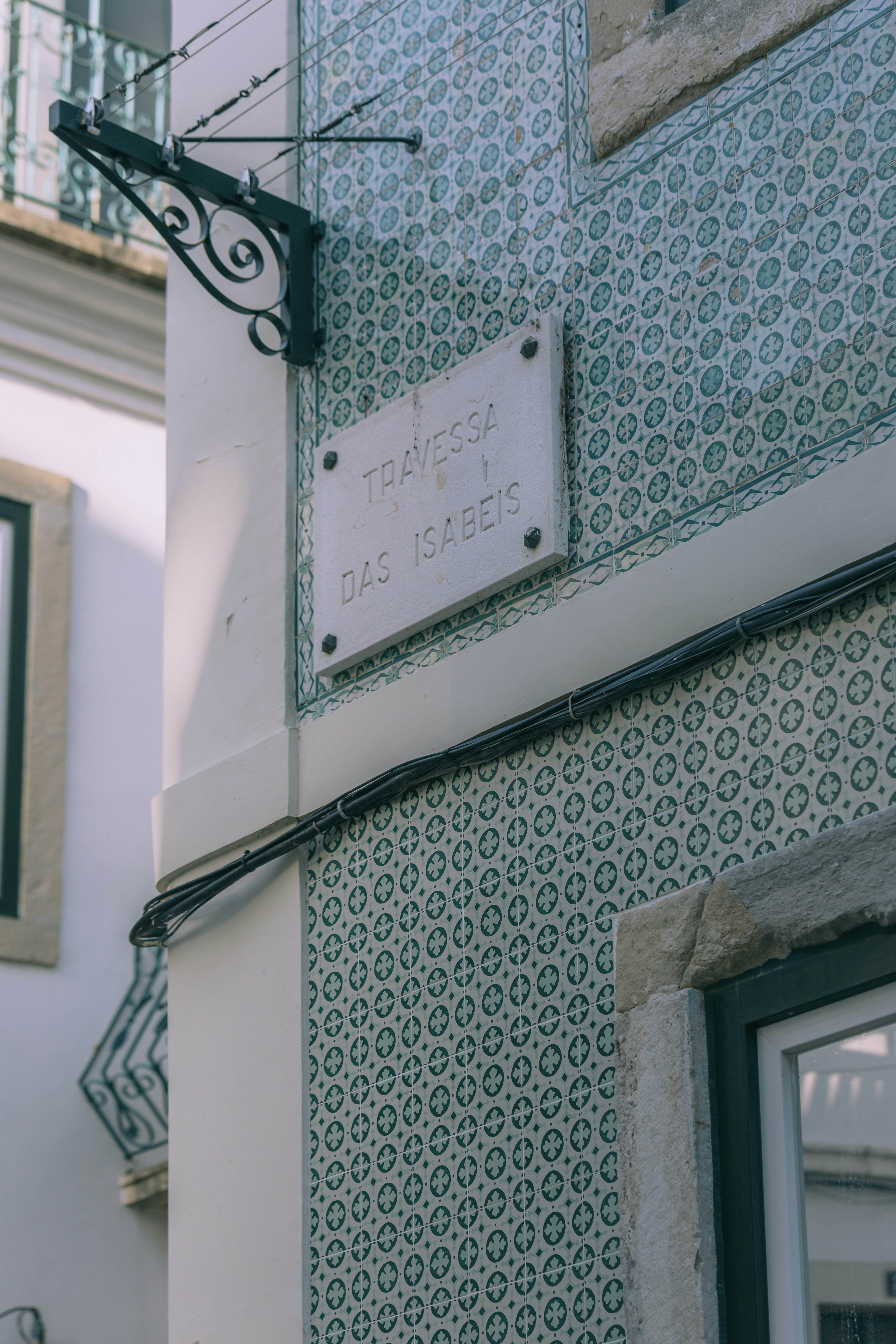 Tilework and Signage: A Quiet Lisbon Facade