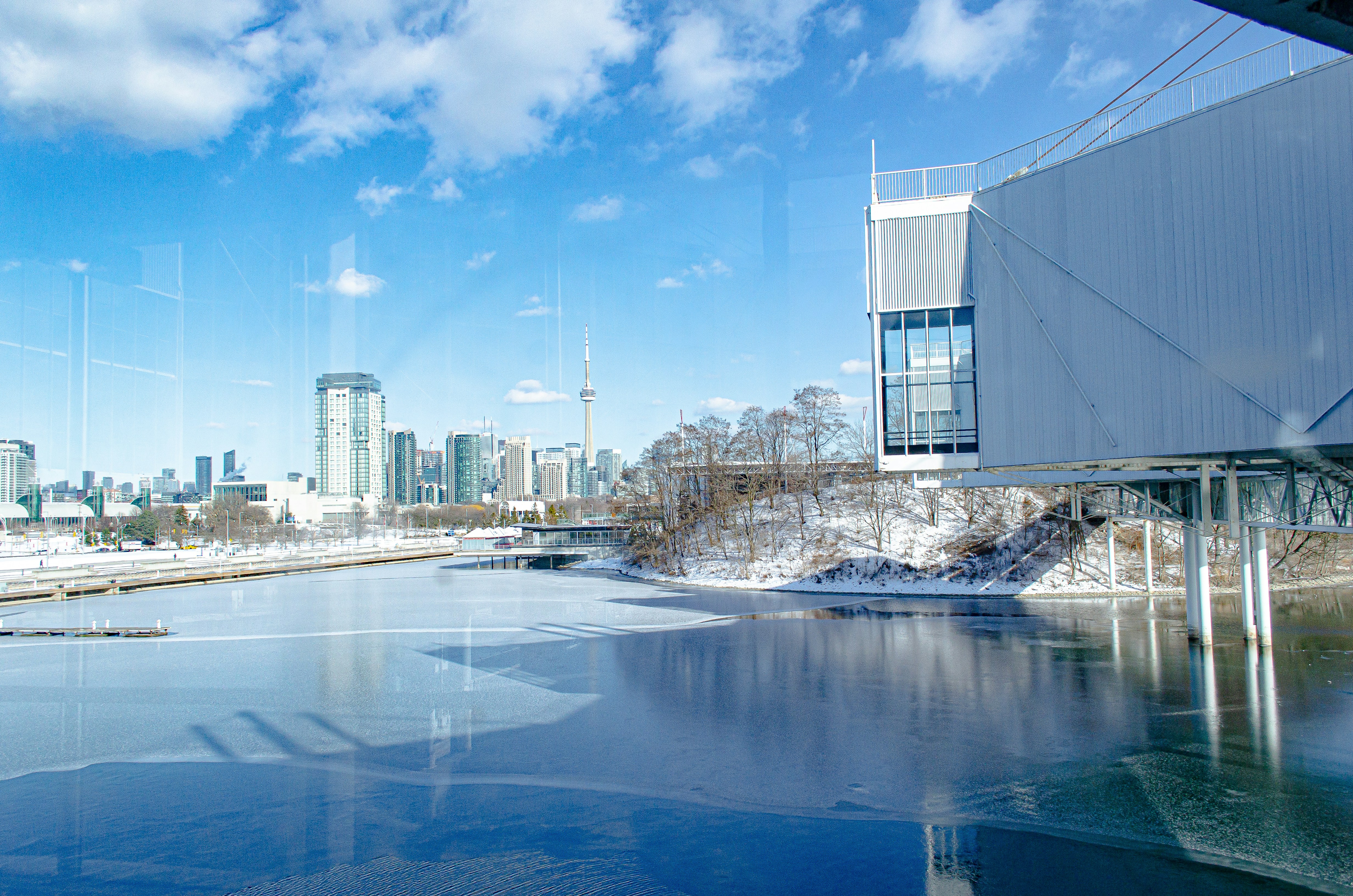 Glass Facade and Ice: Winter Light Over a Quiet City Waterfront