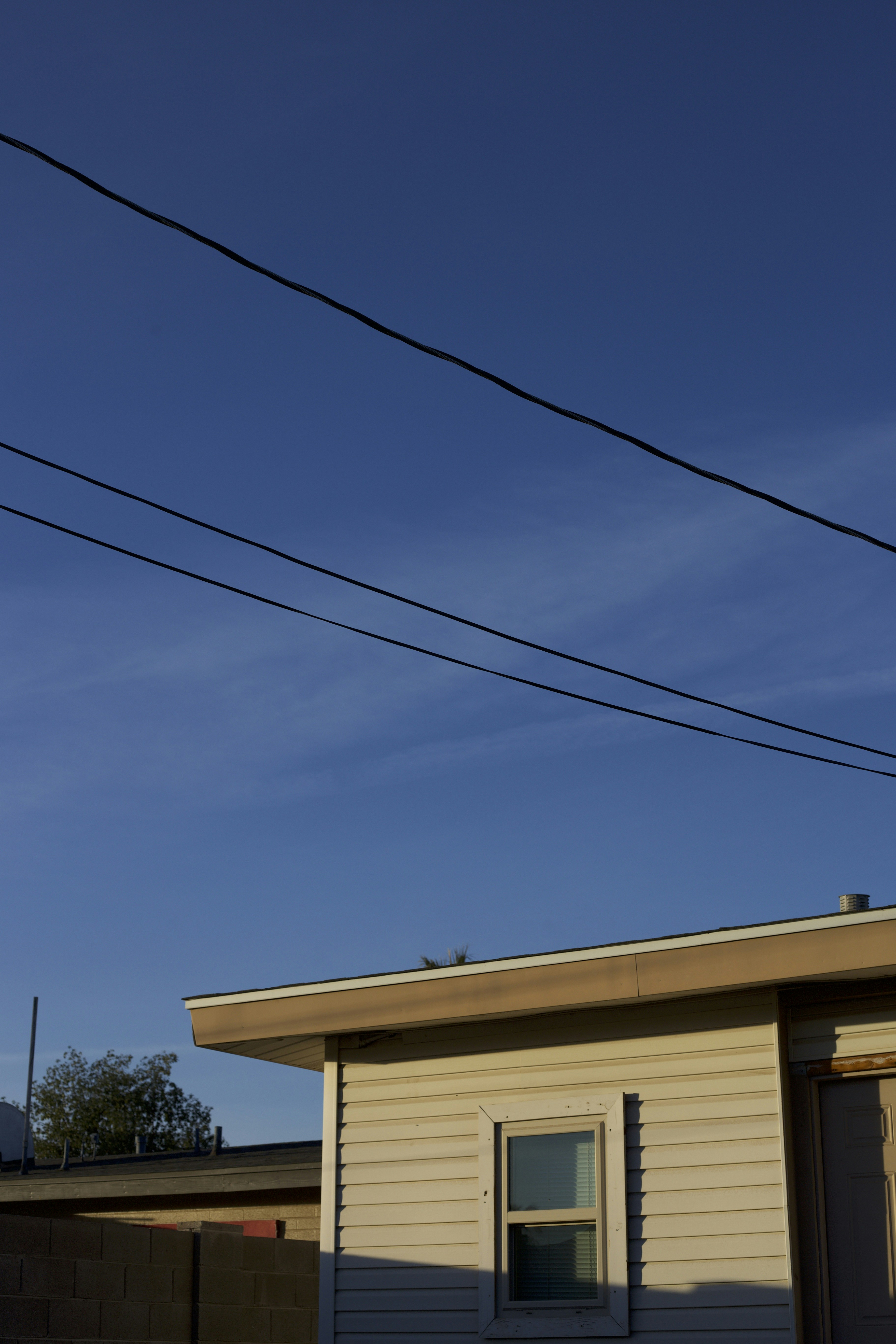 Power Lines Across the Blue: A Quiet Rooftop Sketch
