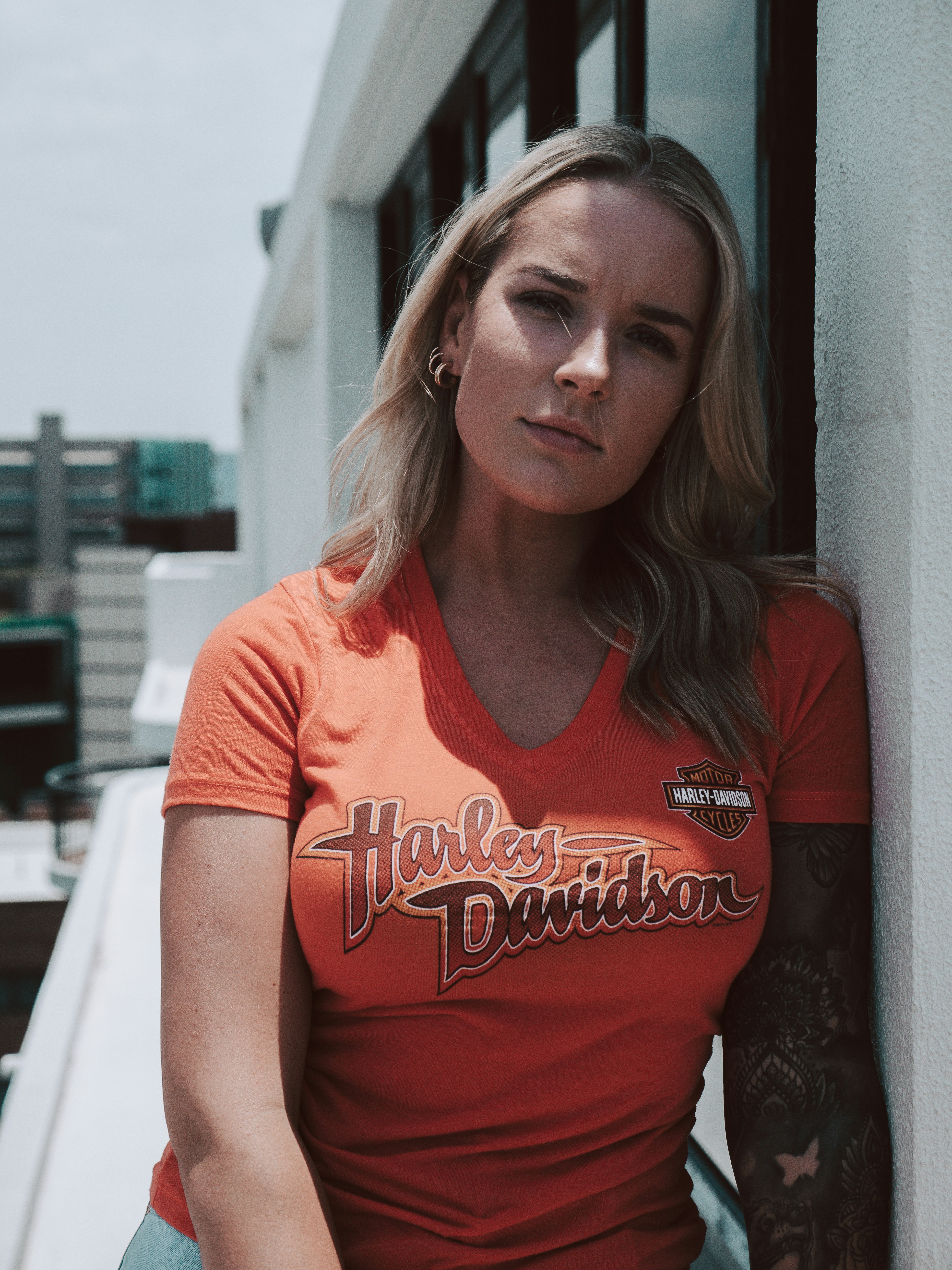 Sunlit Grit on the Rooftop: Portrait in Orange