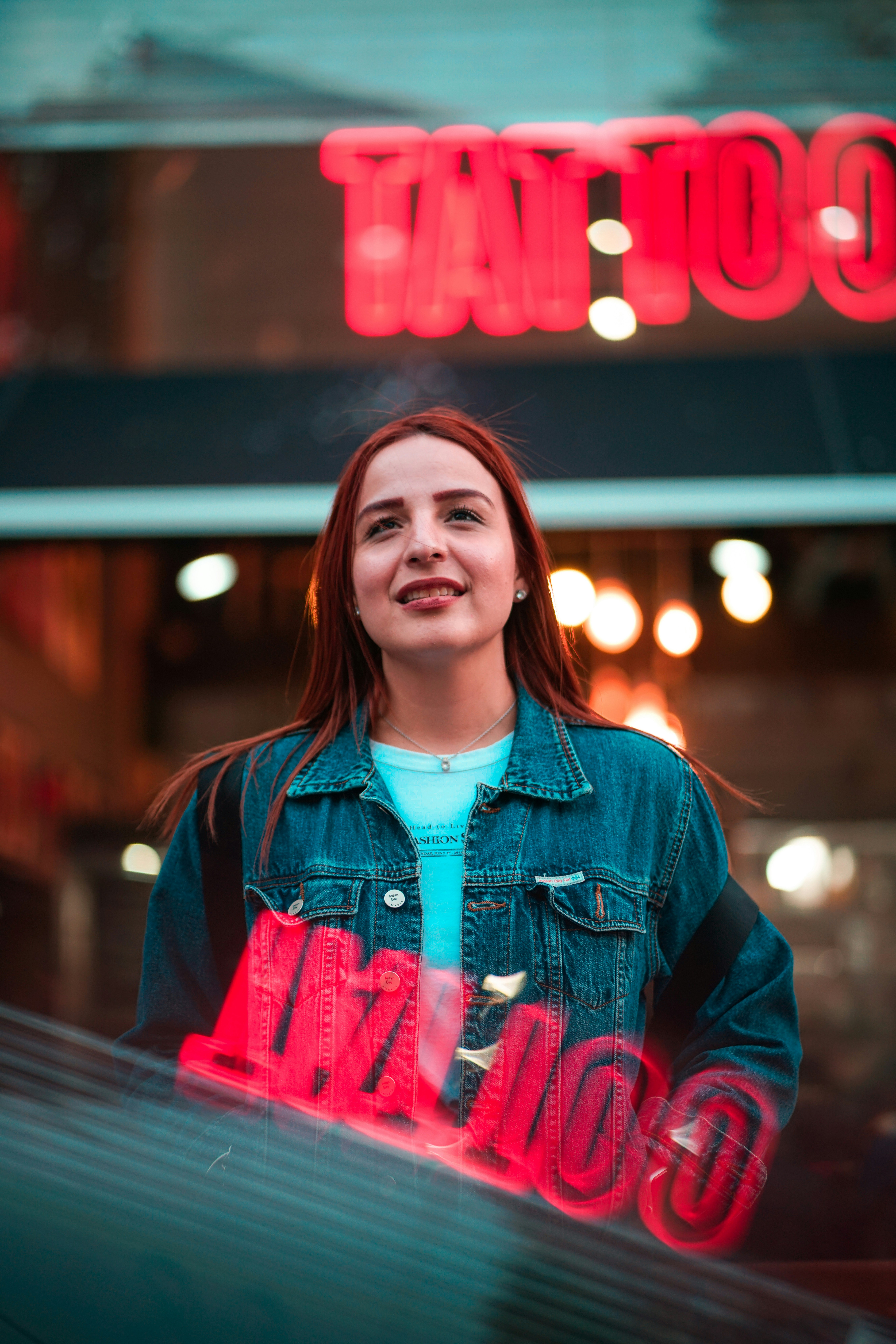 Neon-glow Portrait: A Denim-clad Moment Under Neon Light