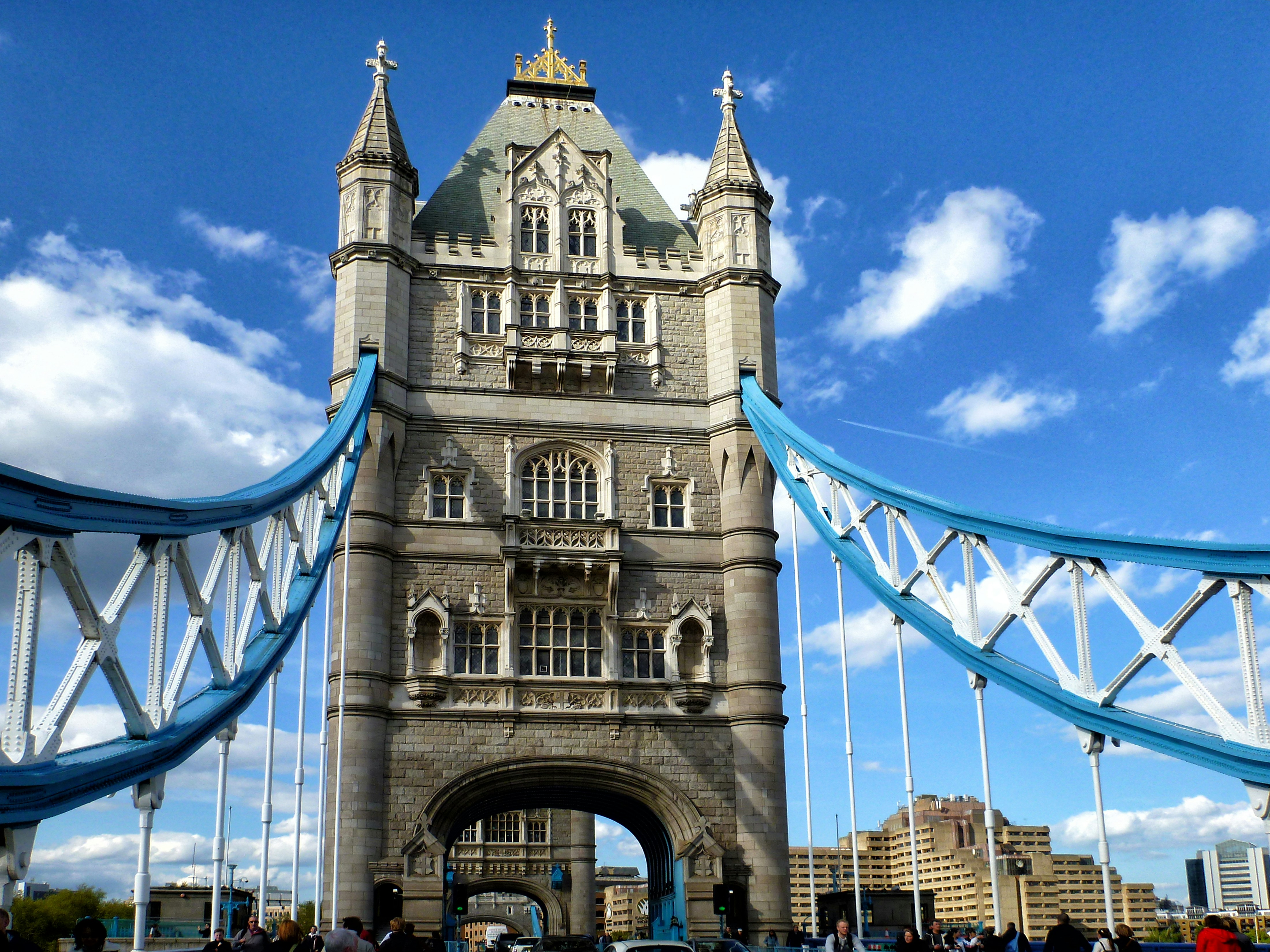 Tower Bridge heading north across the River Thames toward the Tower of London.