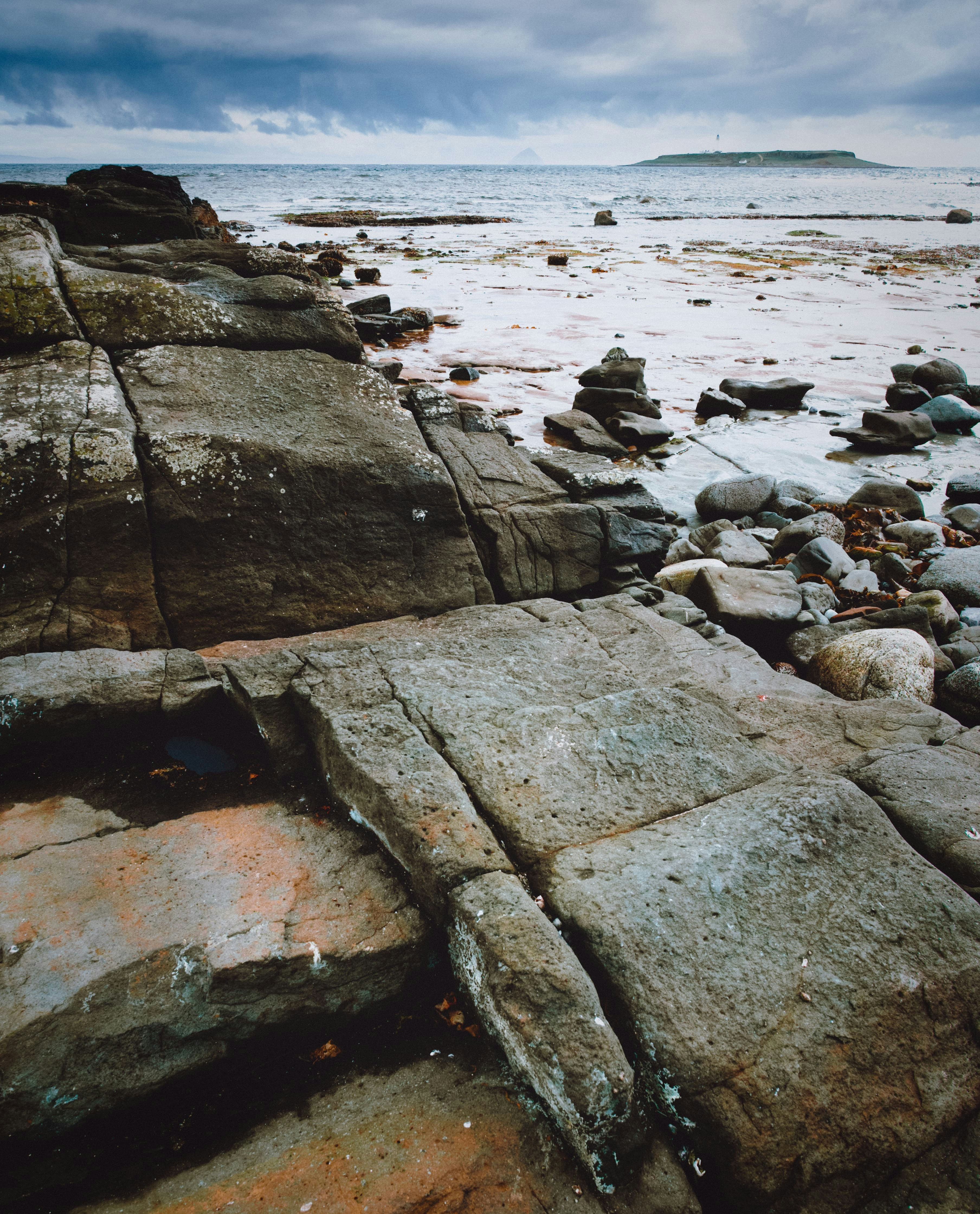 Brown rock formation near sea during daytime photo – Free Uk Image on ...