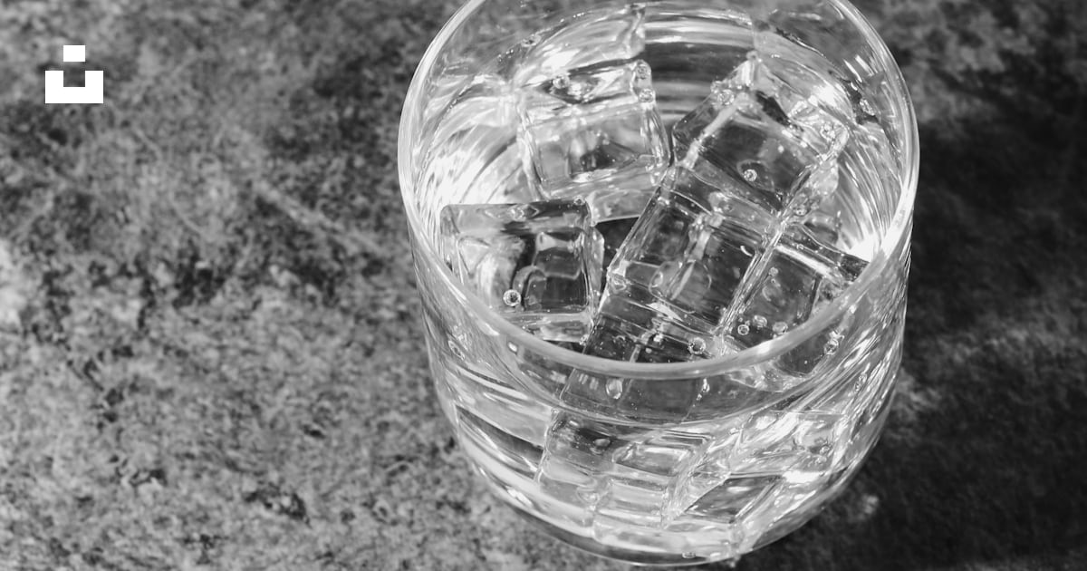 Clear Glass Cup On Gray Textile Photo Free Grey Image On Unsplash