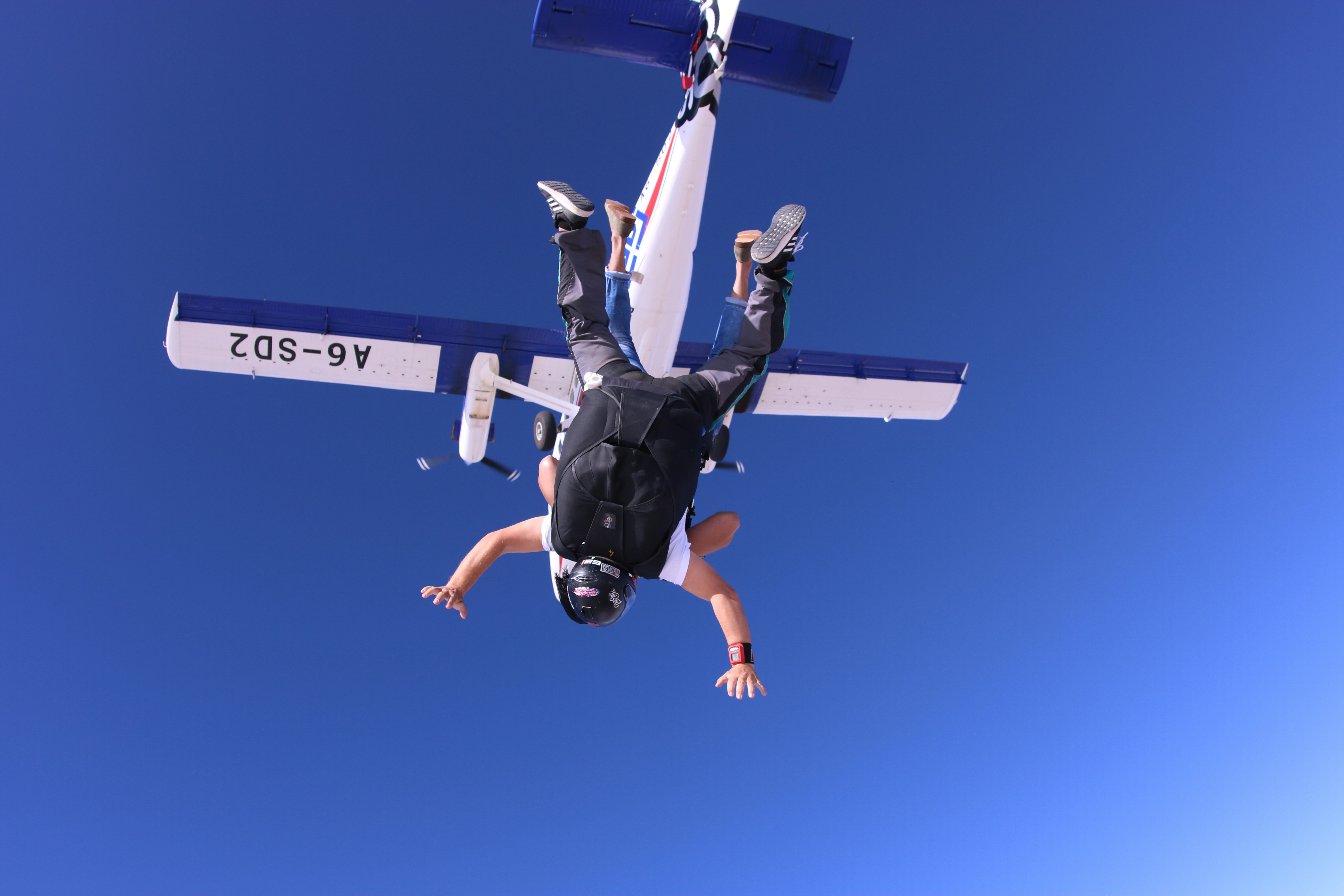 Freefall Portrait: Skydiver in Bright Blue Skies