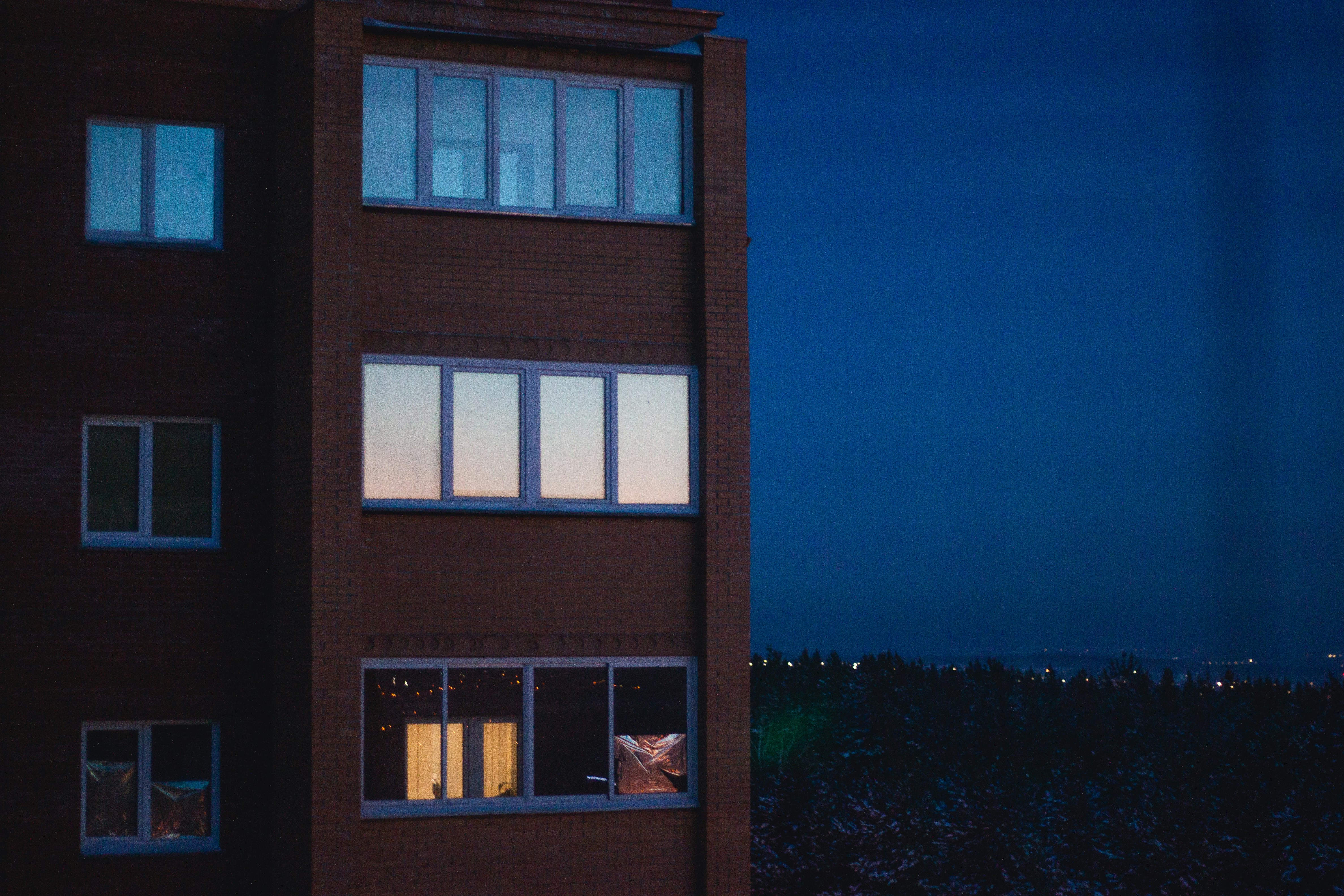 brown wooden framed glass window
