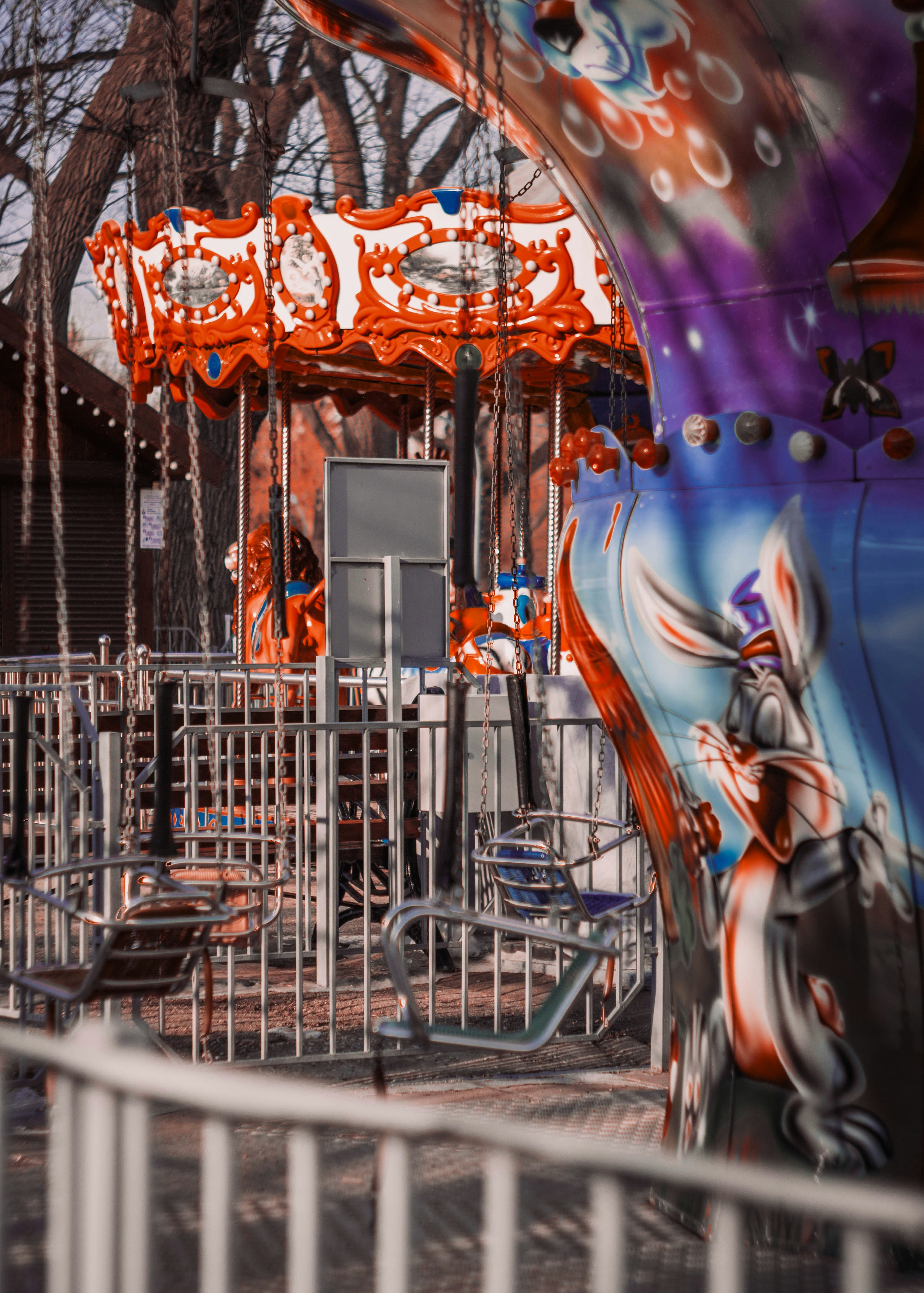 Carousel Rails and Rabbit Graffiti: A Quiet Carnival Moment