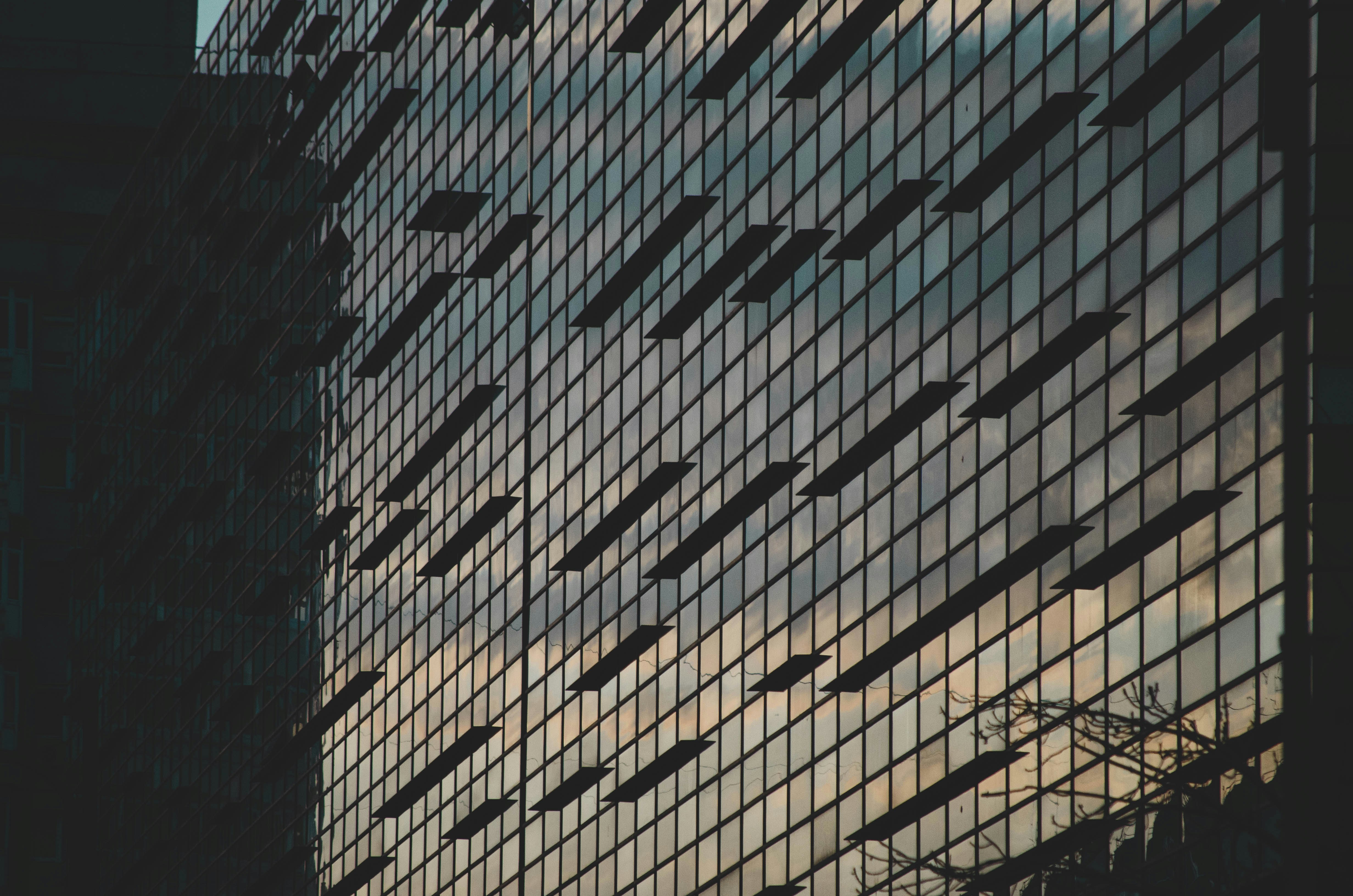 Sunset Reflections in a Glass Facade: Quiet Geometry of Light