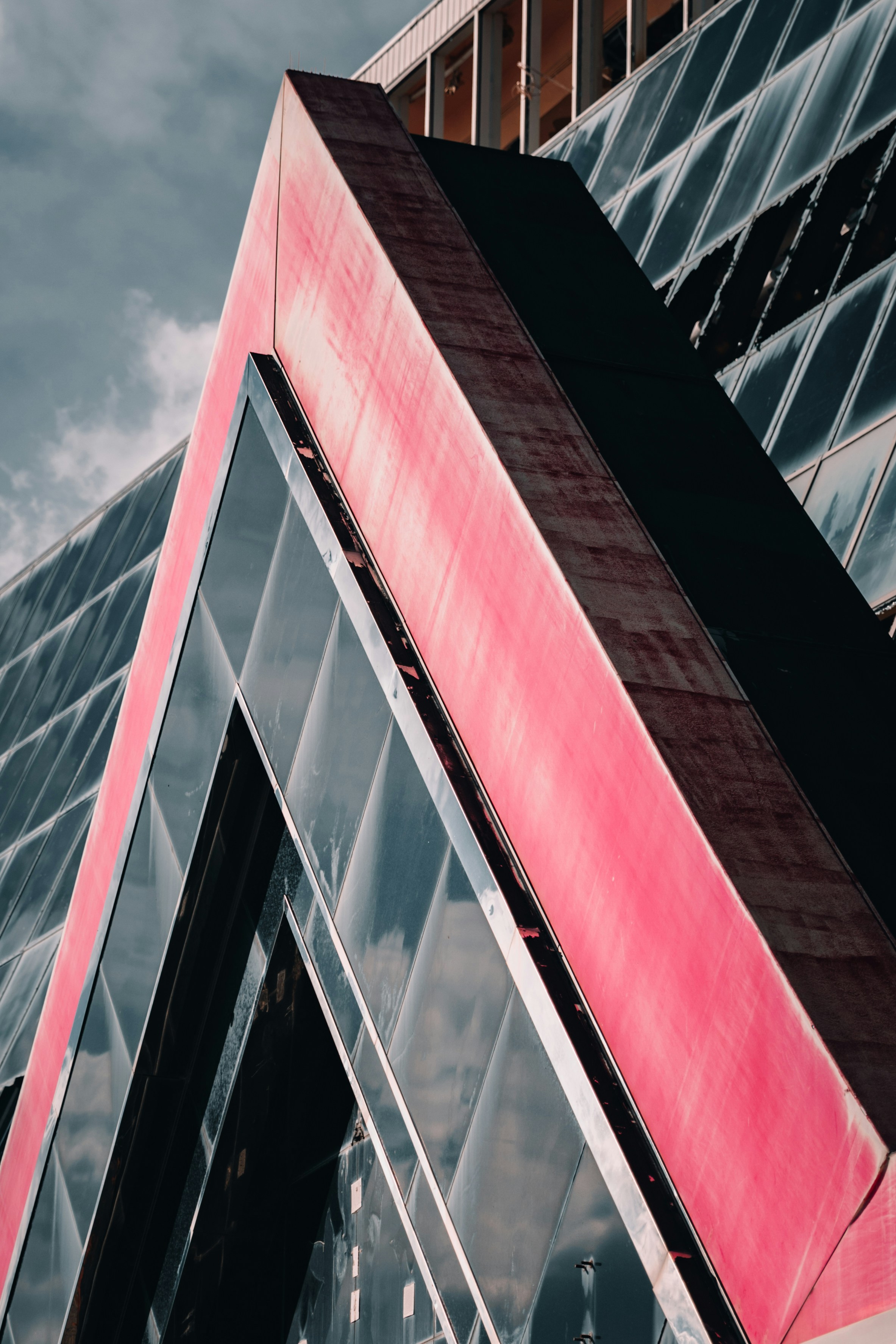 Neon Frame: A Bold Pink Edge Cutting Through Glass Facade