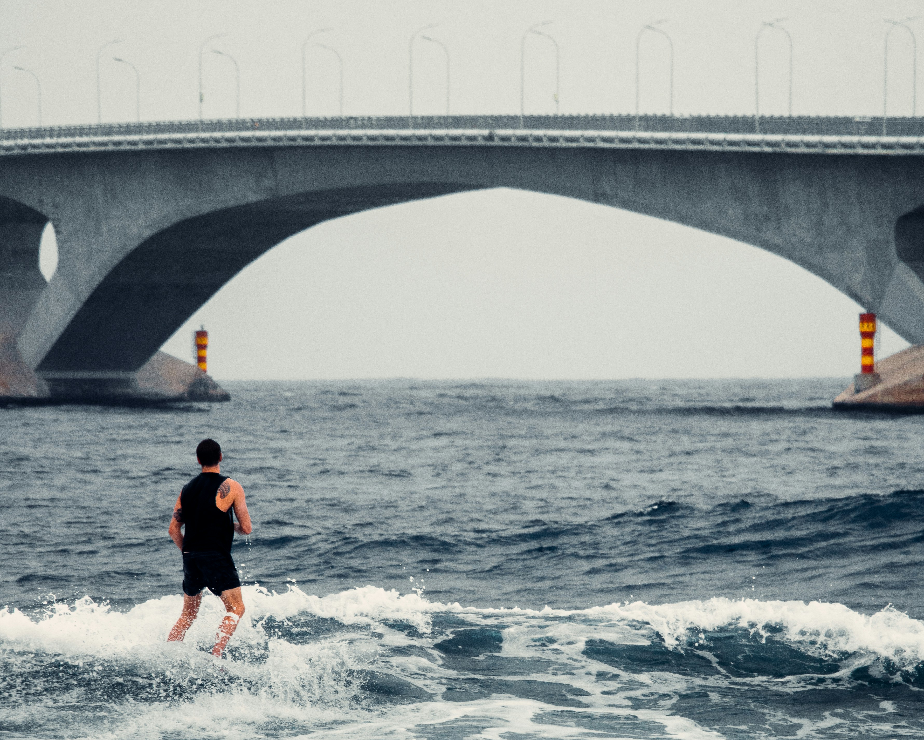 Coastal Sprint Under the Bridge Arc