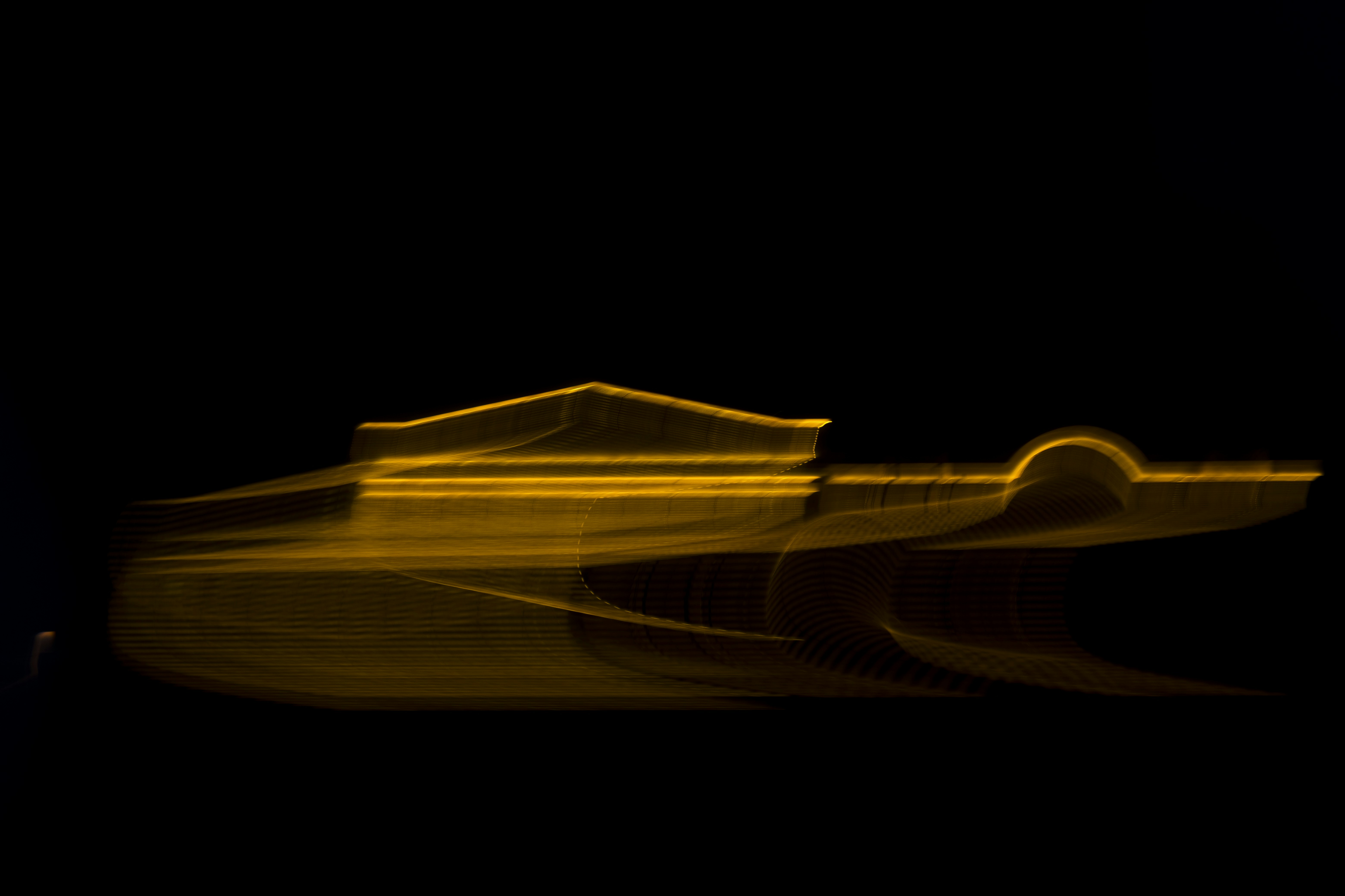 Golden Axes of Light: Long-Exposure Silhouette of a Structure
