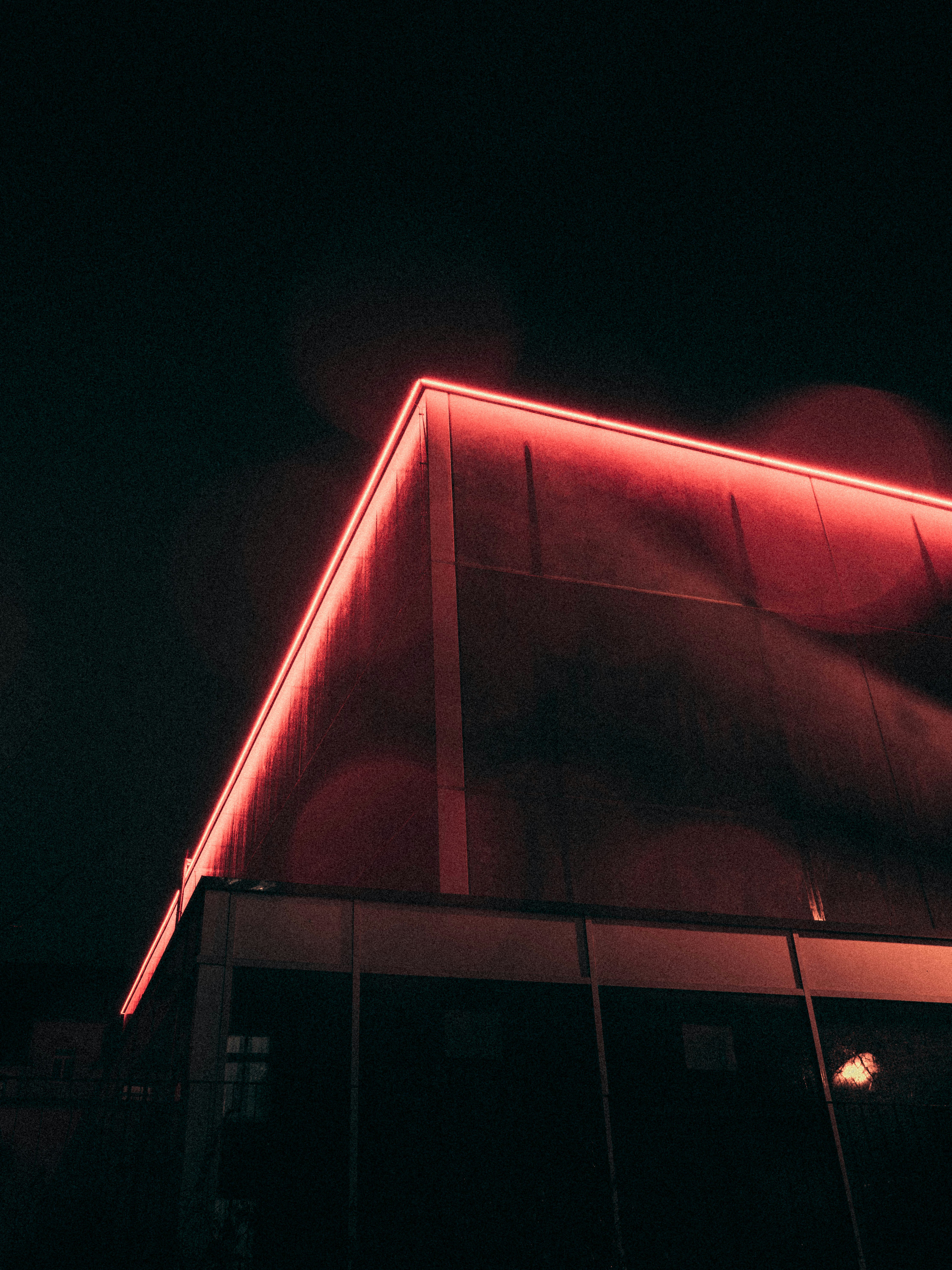 Red and black building during nighttime photo – Free Lighting Image on ...