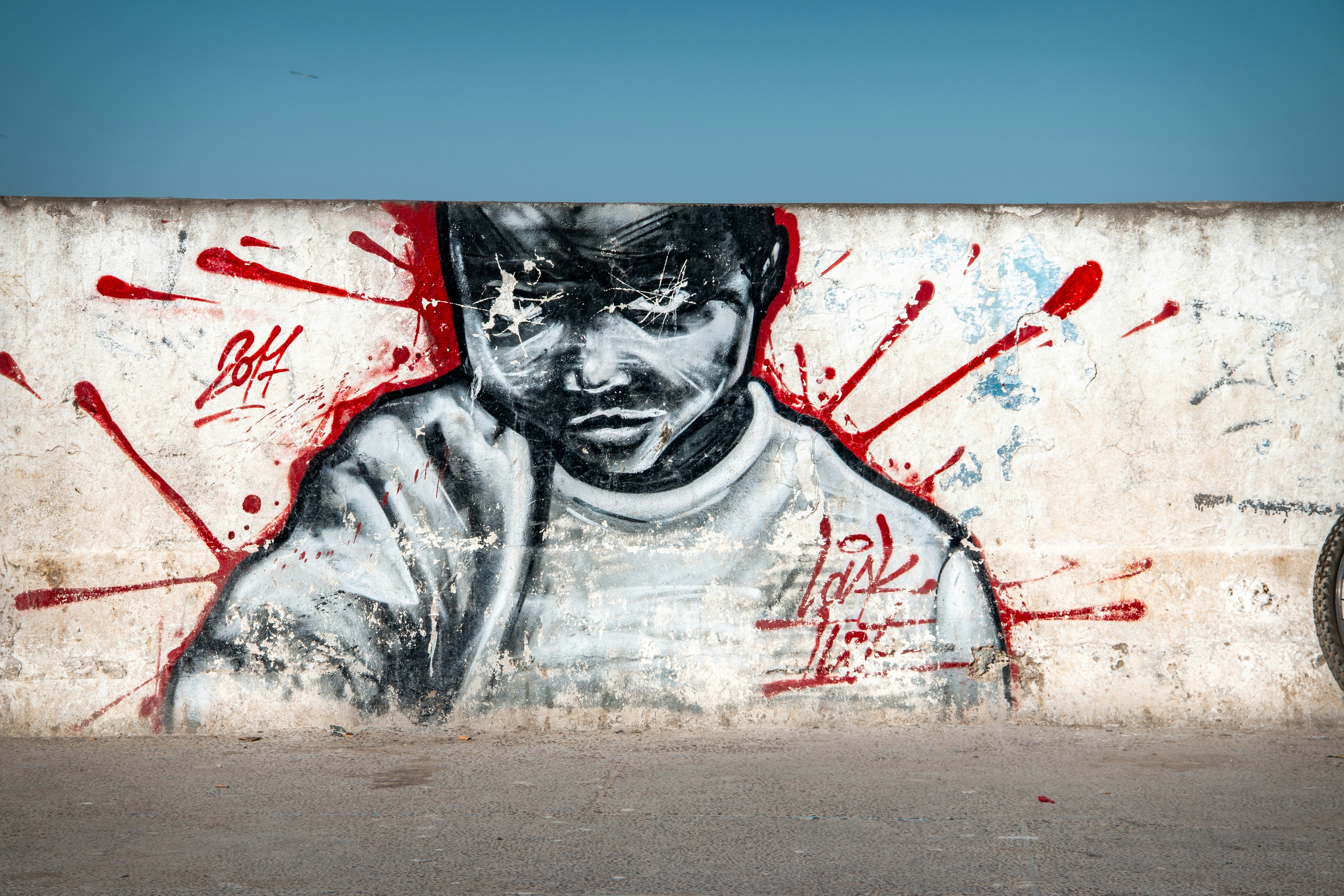 Echoes of Innocence: A Street Art Reflection
