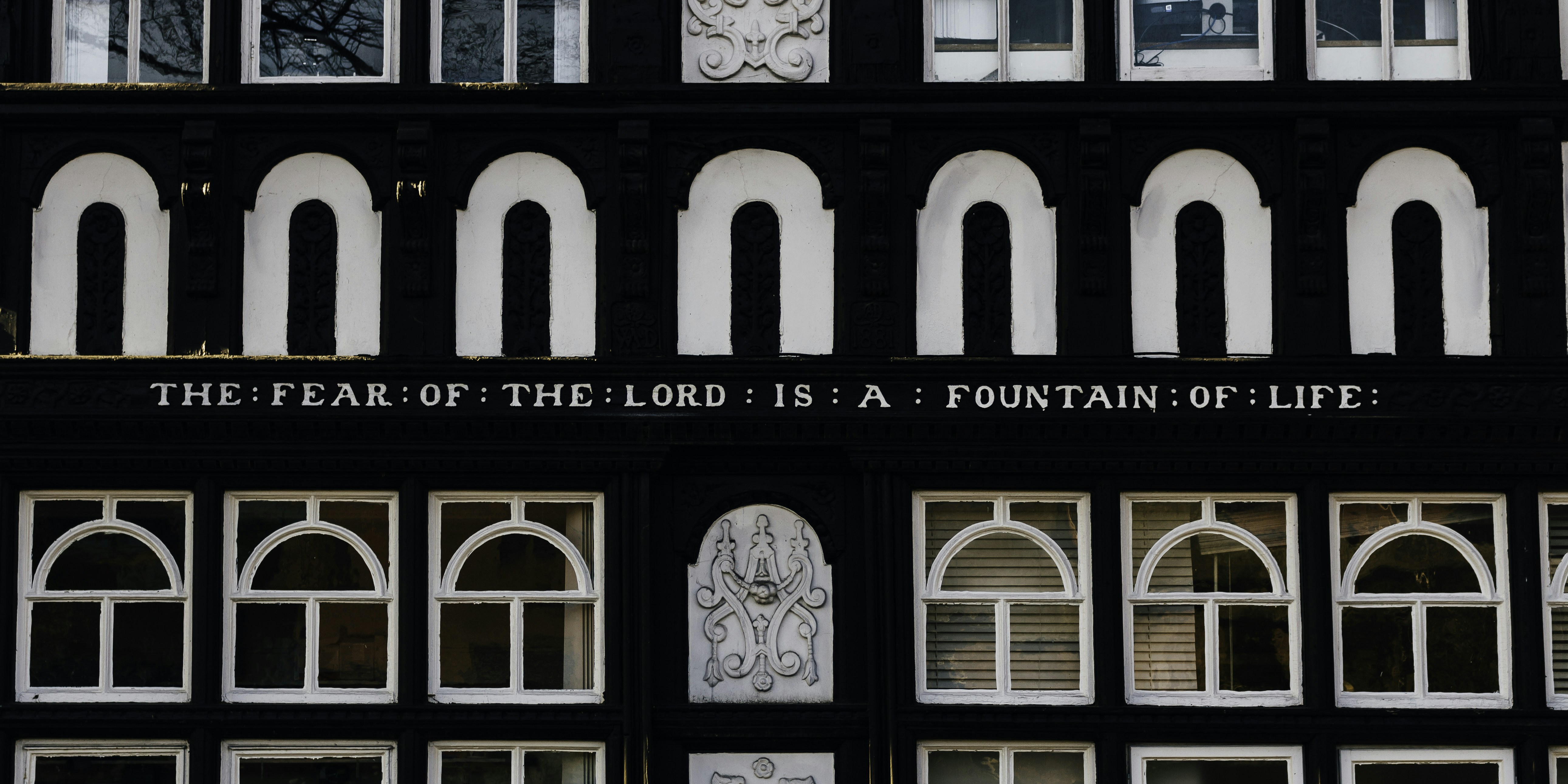 Facade of a Historic Gatehouse: The Fear of the Lord Inscription