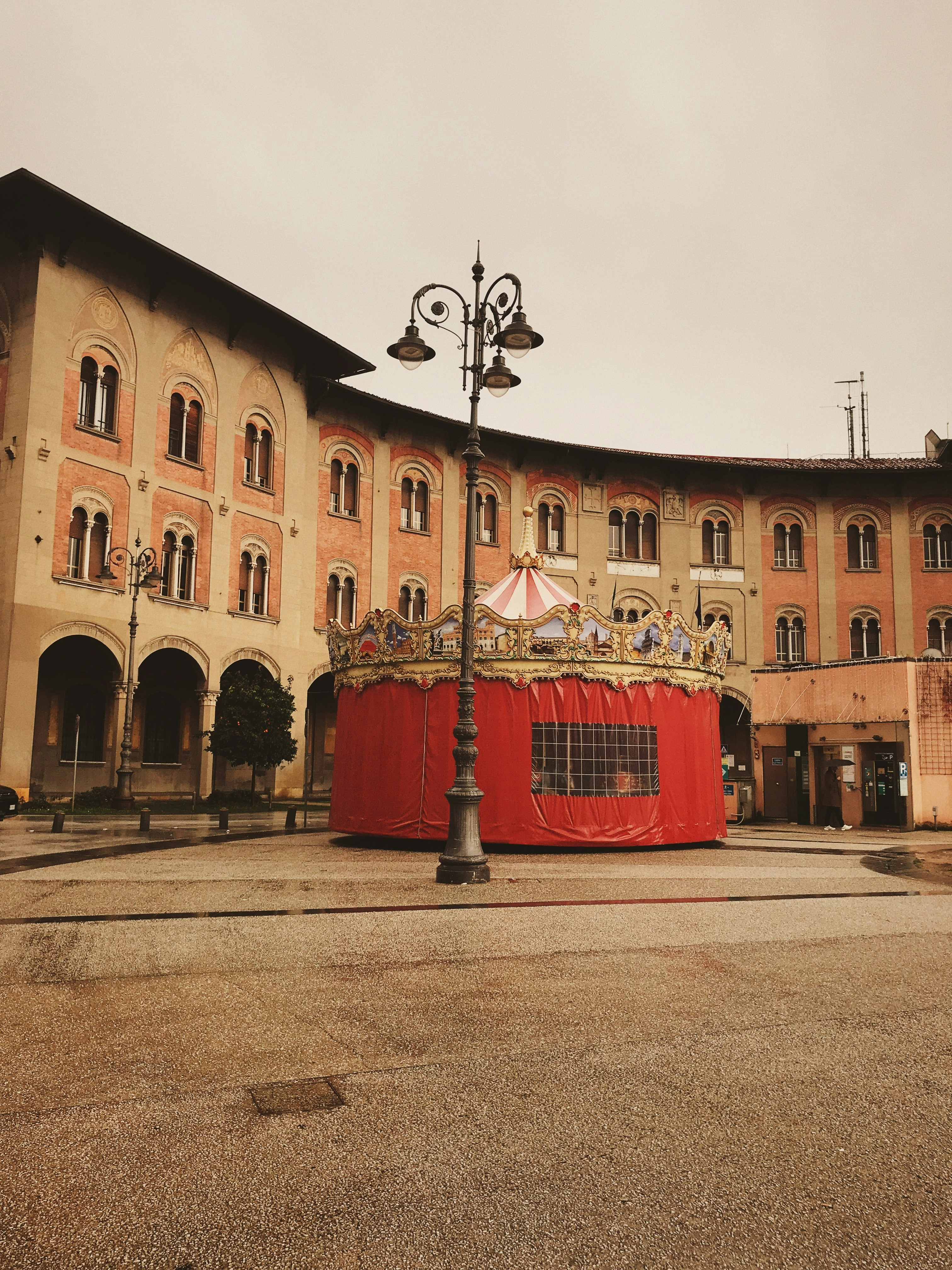 Whimsical Carousel Amidst Historic Architecture