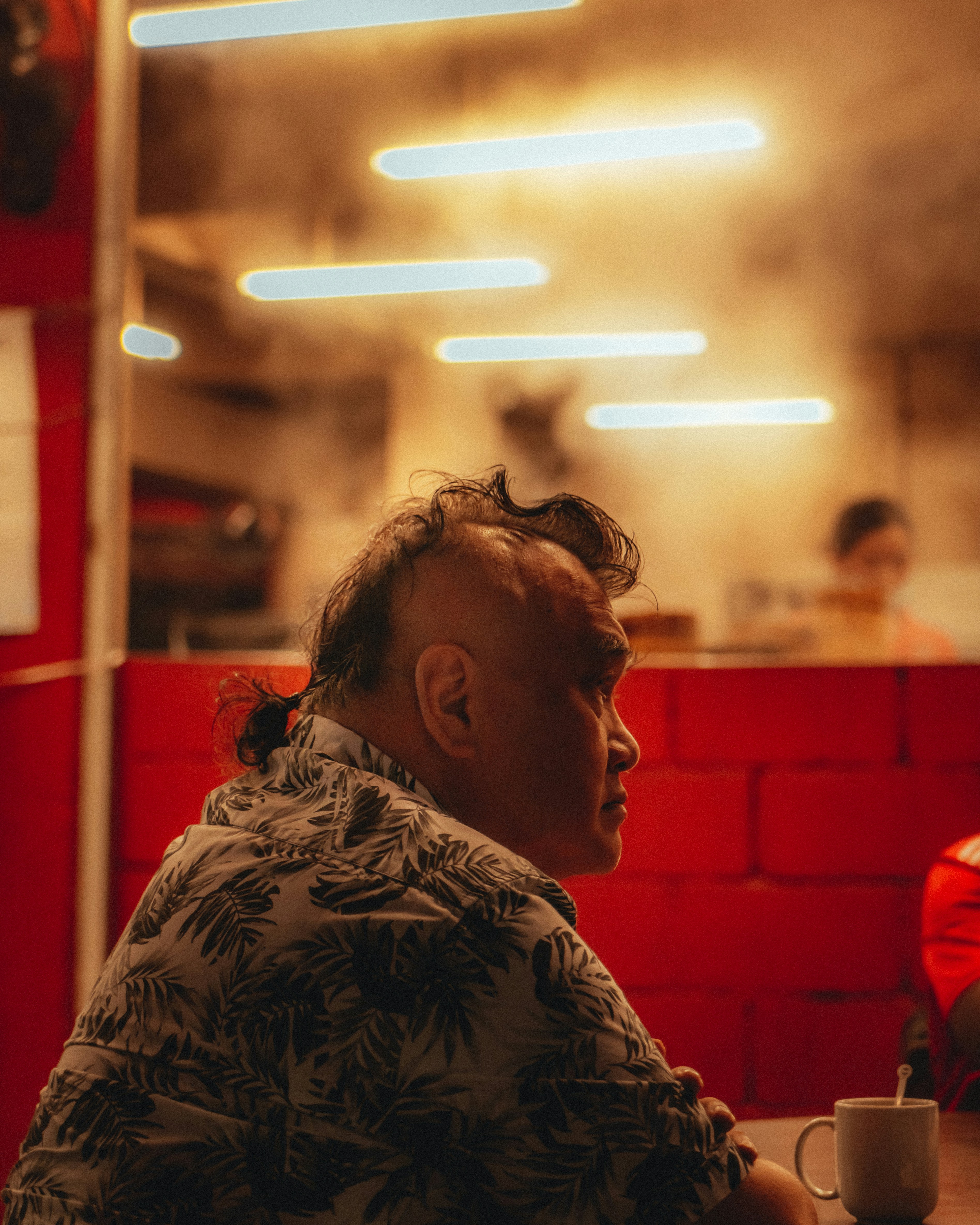 Man eating at Dim Sum Restaurant at Geylang, Singapore

