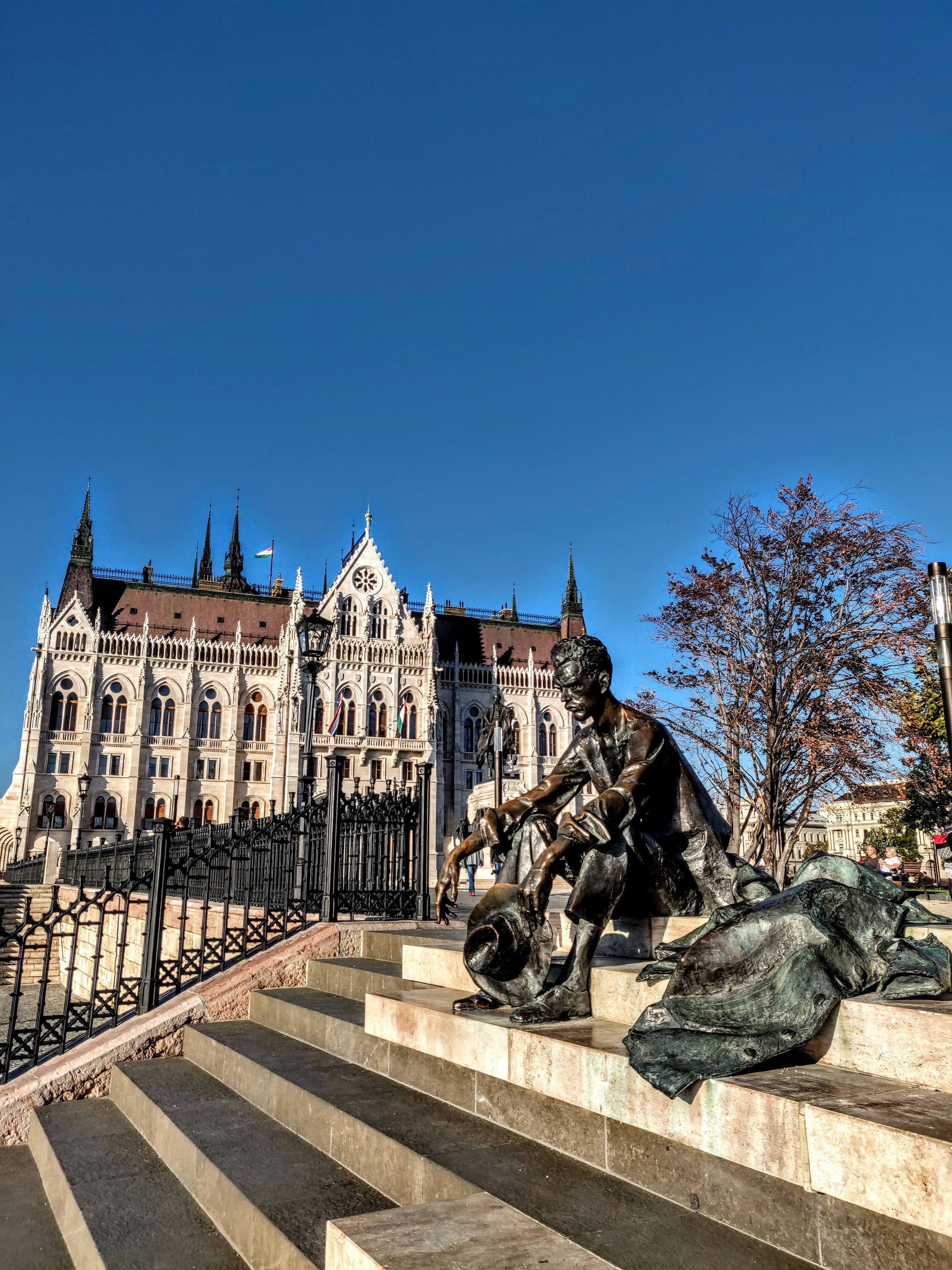 Bronze Contortions: A Sculpted Moment Before the City Clock