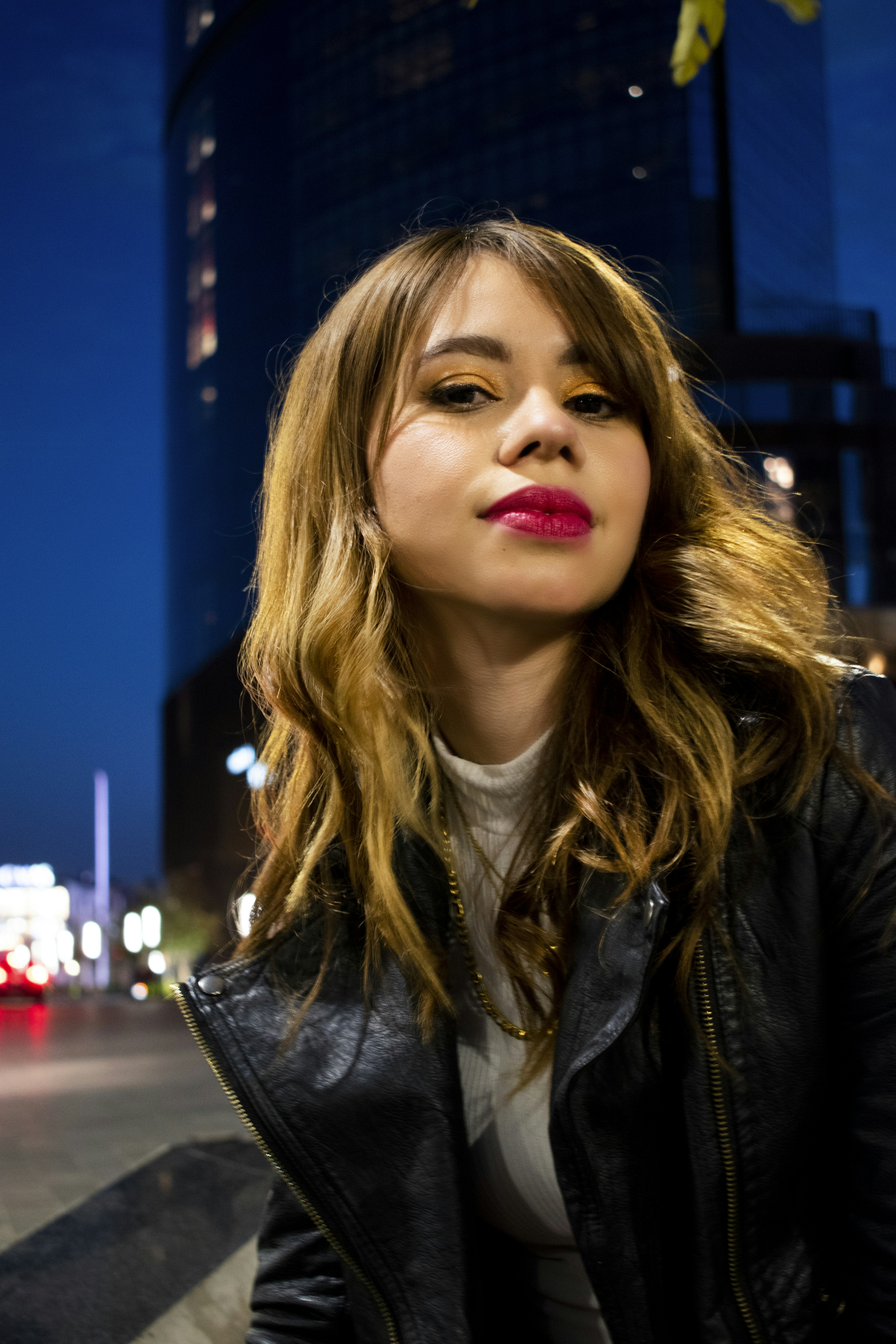 woman in black leather jacket