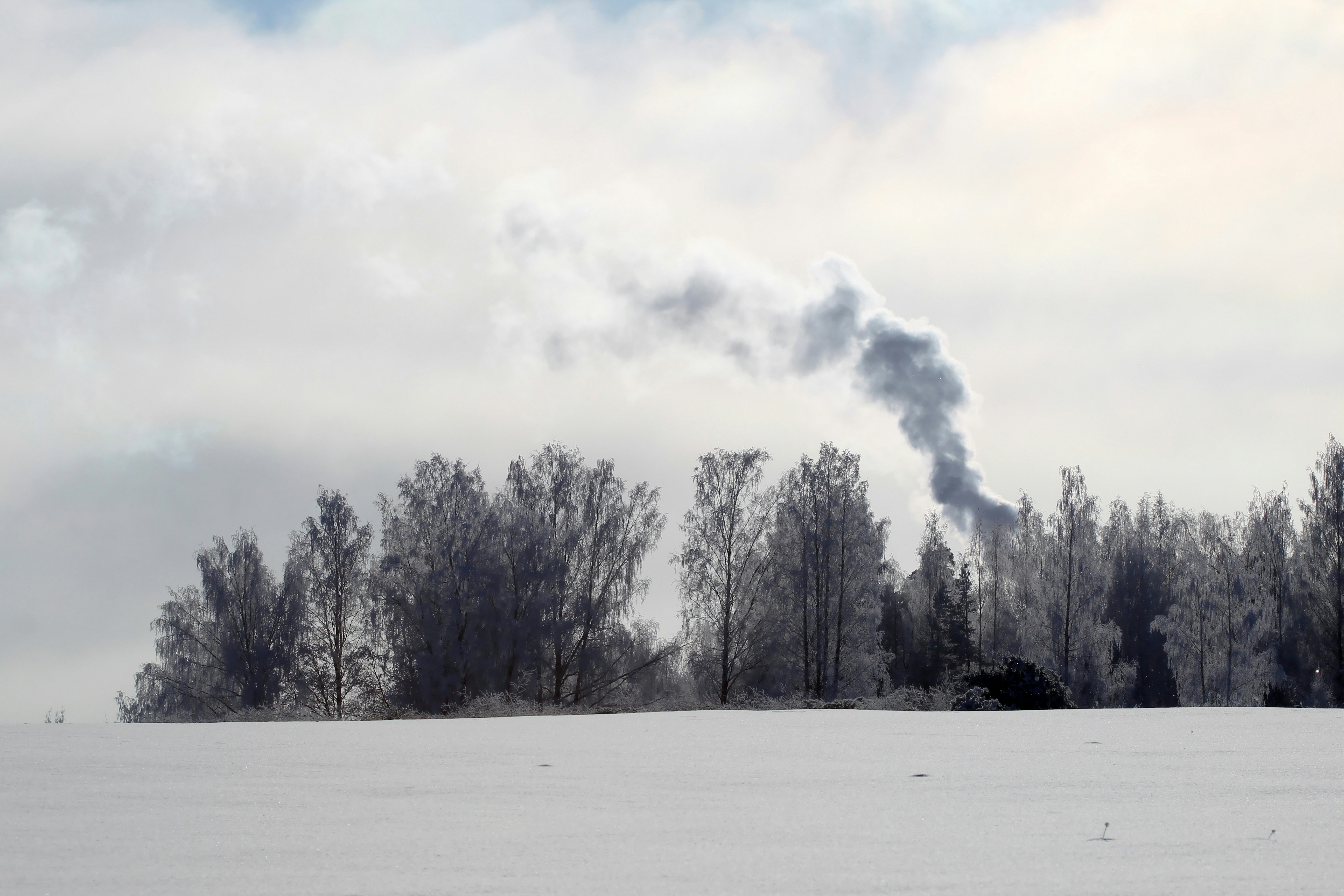 Plume Above the Snow-Dusted Horizon