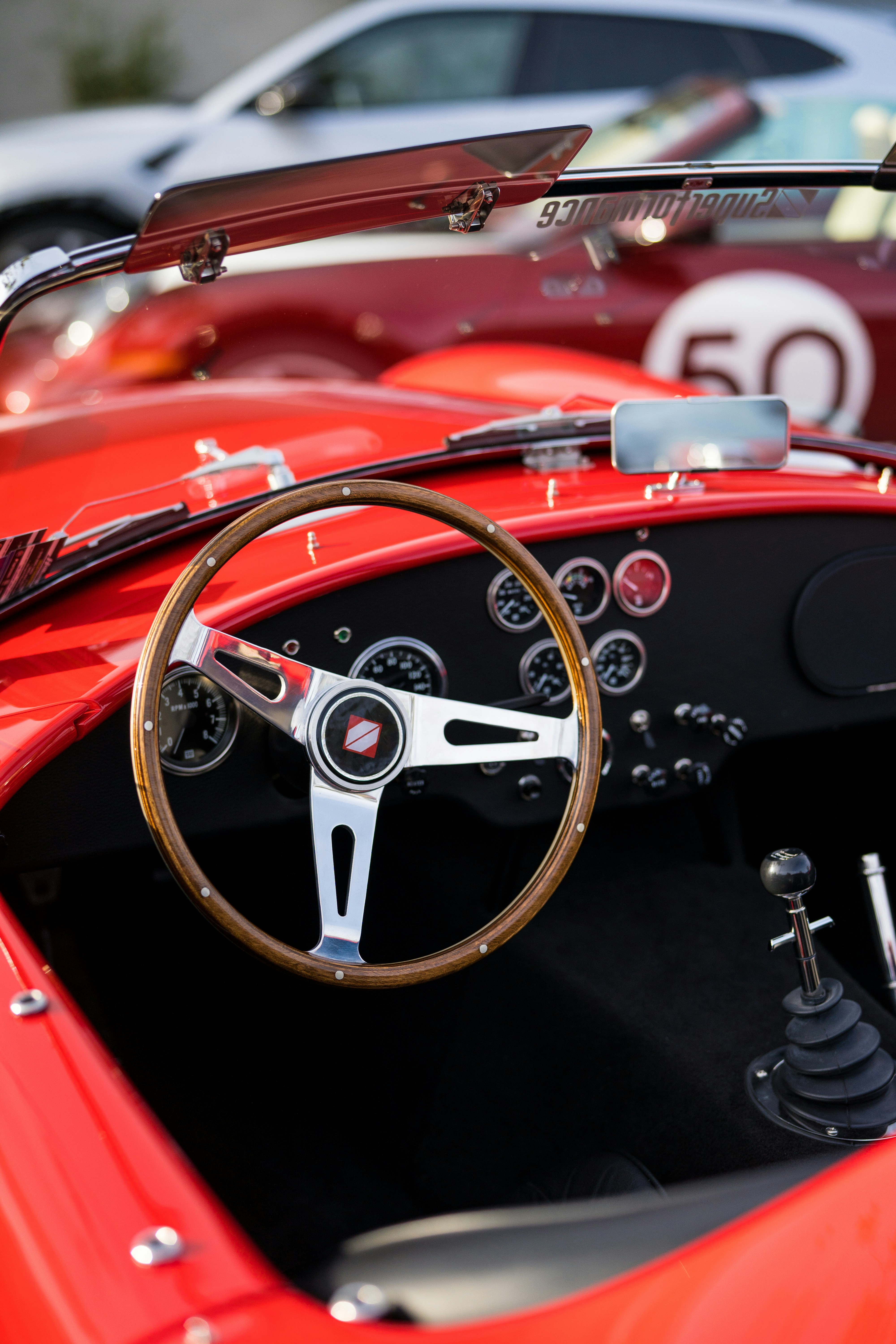 Circuits of Red: The Wooden Steering Wheel of a Classic Racer
