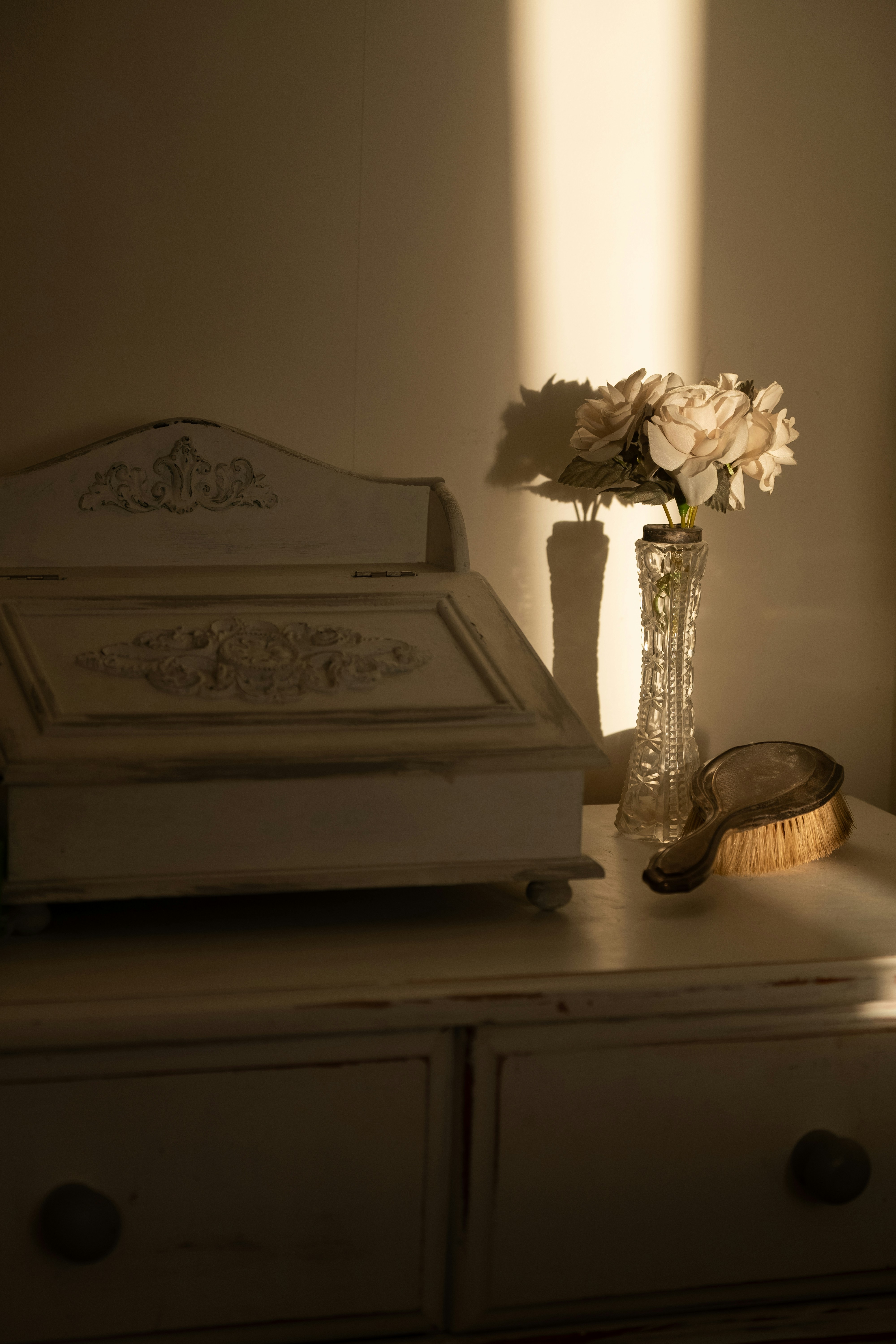 Dusty Vintage Vanity: Vase of Roses and a Worn Jewelry Box