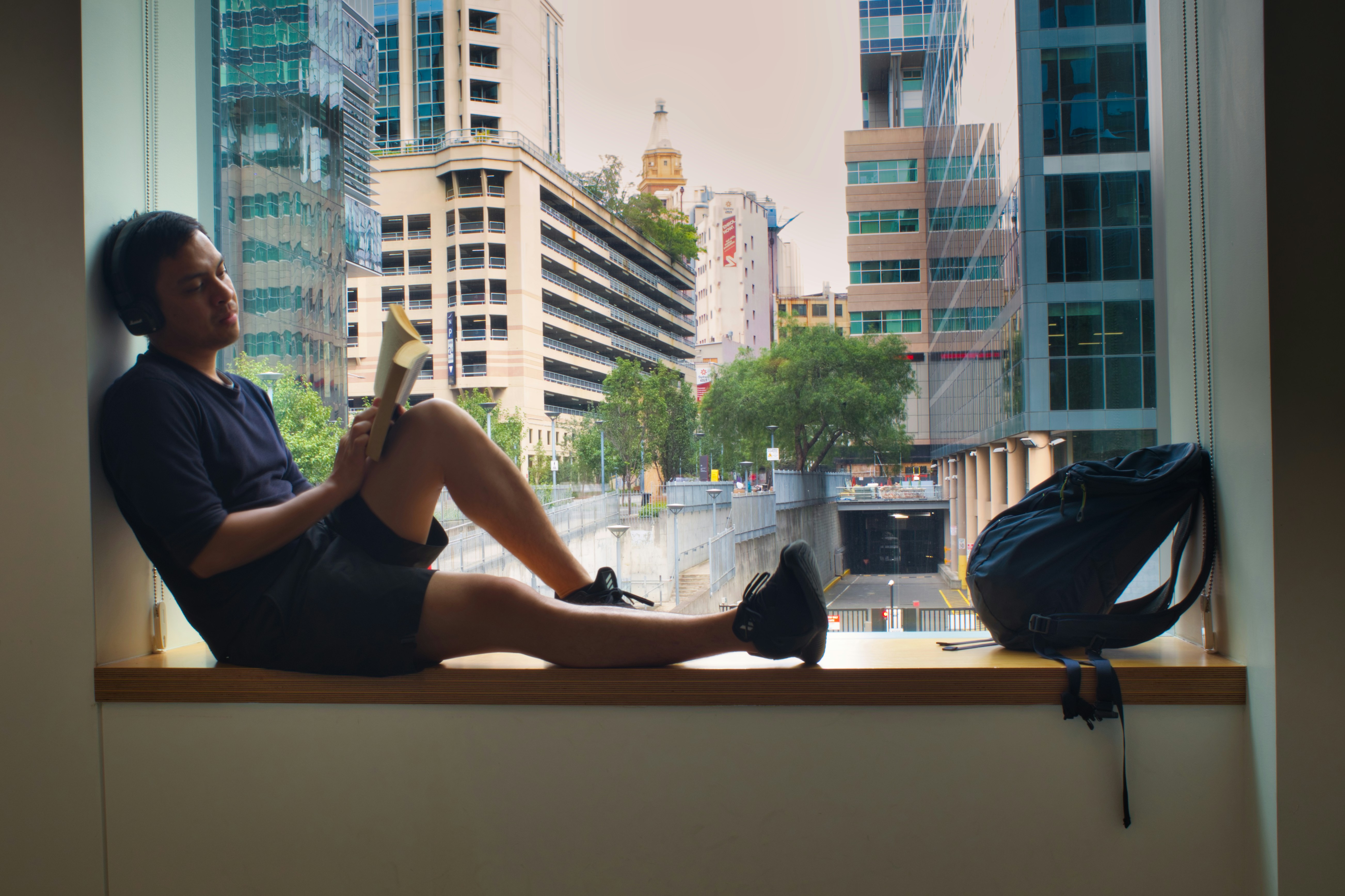 Reclined in a Glass Box: A City Window Moment