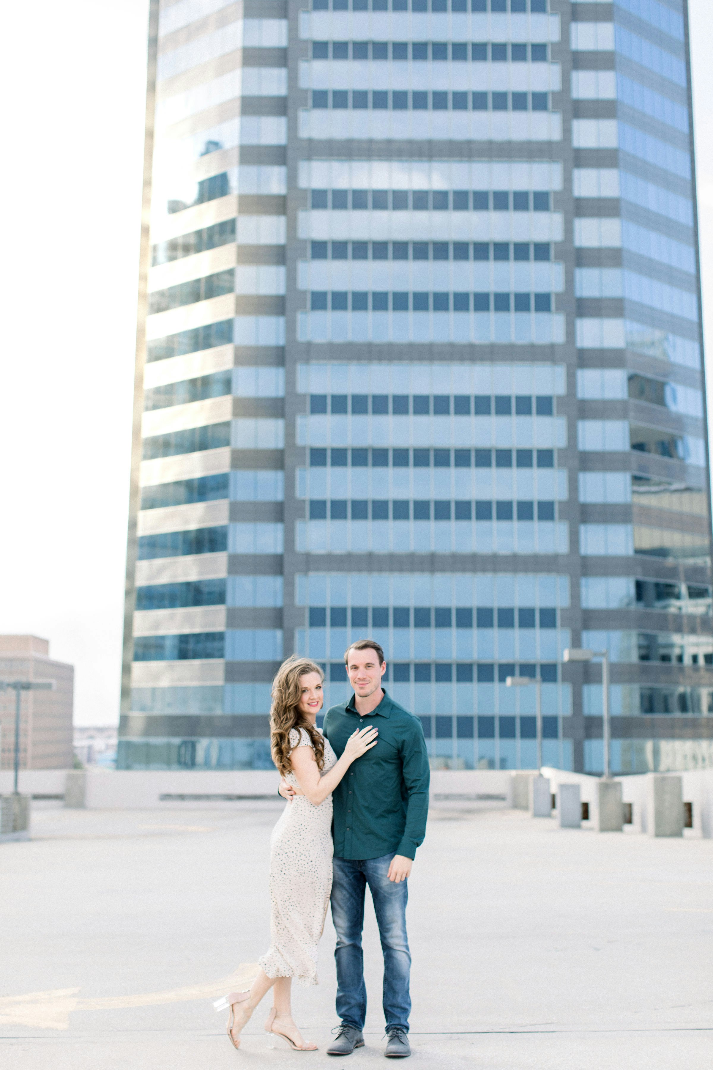 Skyline Duo: A Quiet Moment on a Rooftop with a Modern Peak