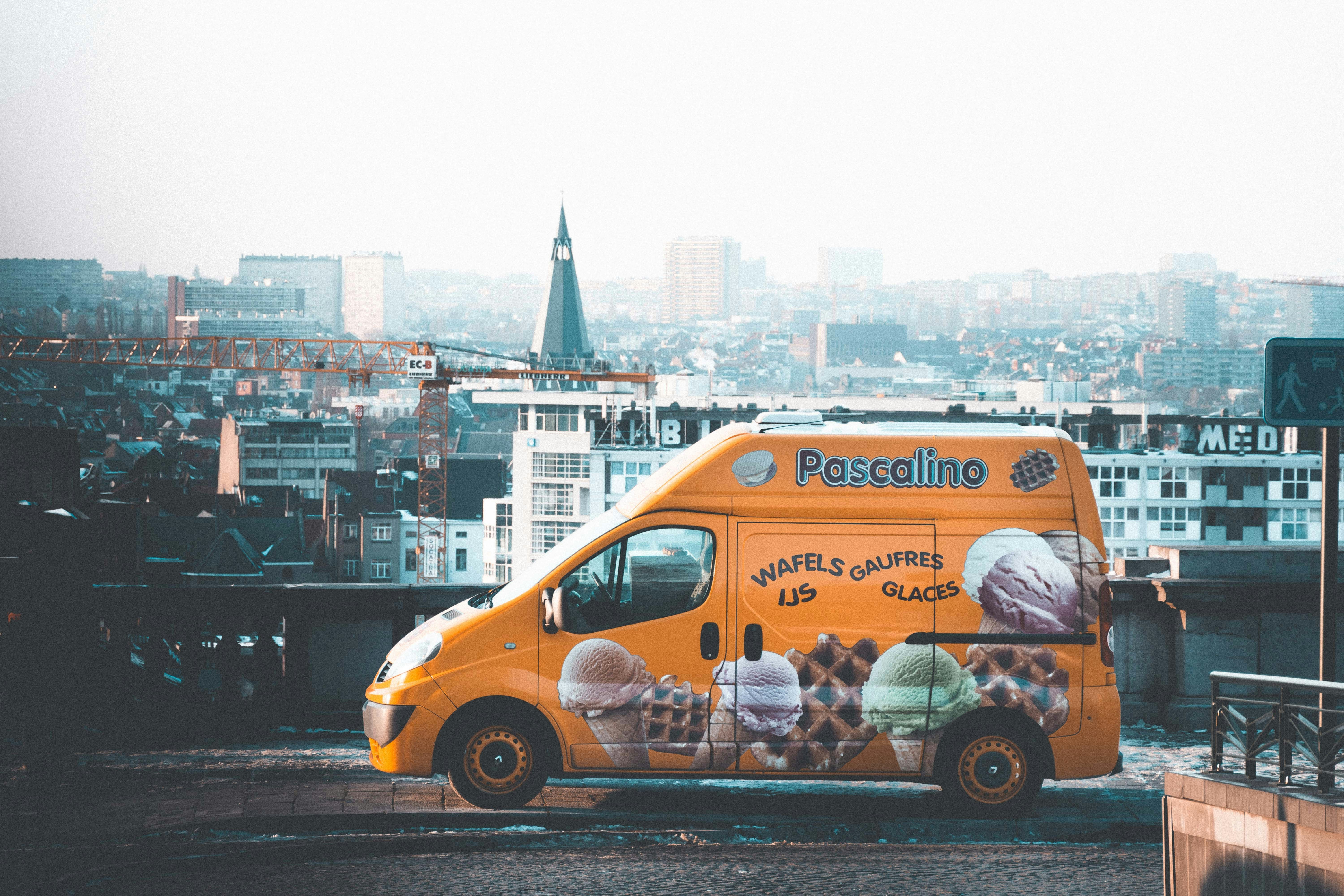 Rooftop Gelato: An Orange Van Braving the City Mist