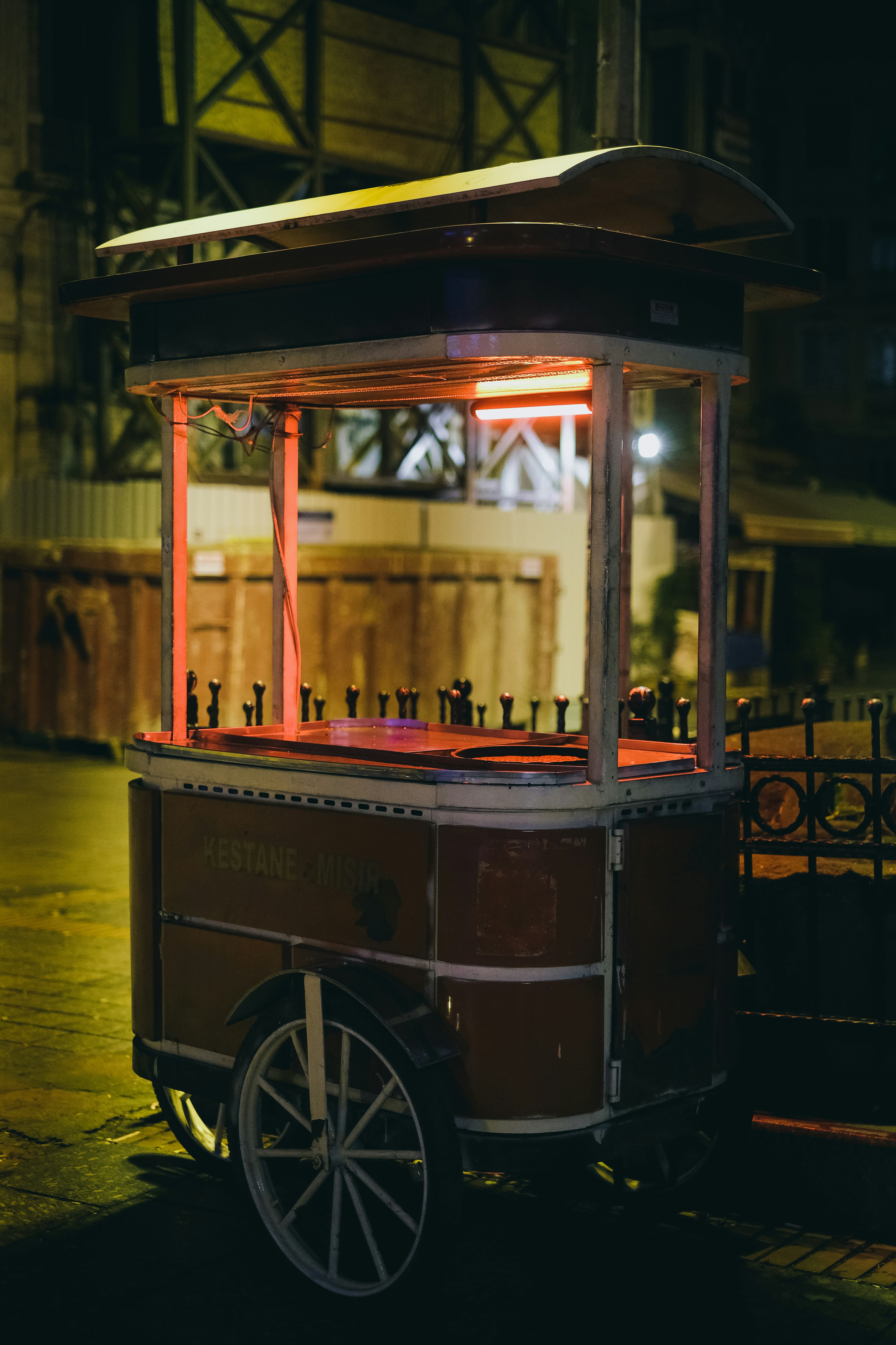 Midnight Neon and Steam: A Vintage Street Cart by City Lights