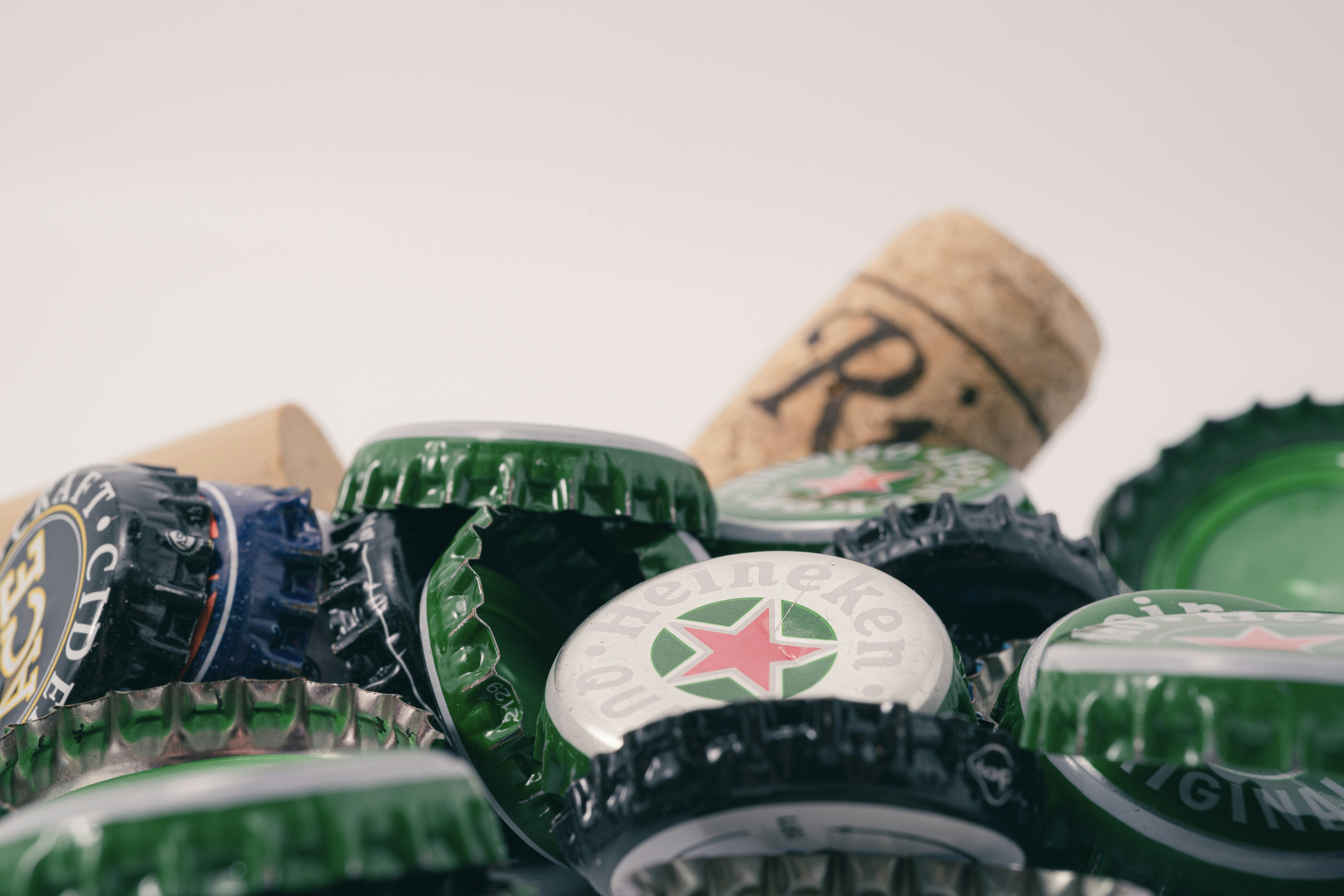 Caps Lock: A Close-Up of Liquor Bottle Caps Resting in a Pile