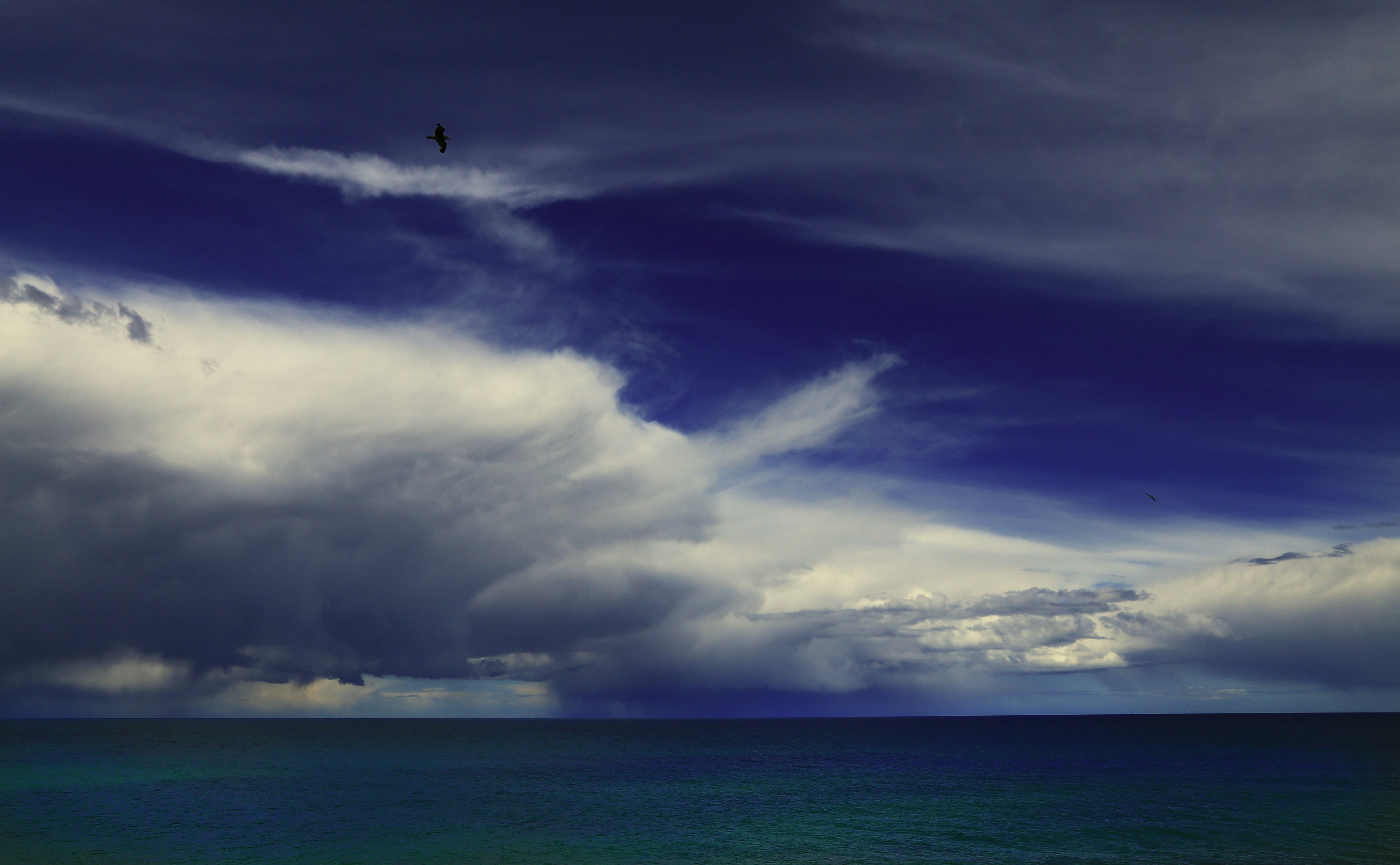Storm Edge over a Quiet Sea