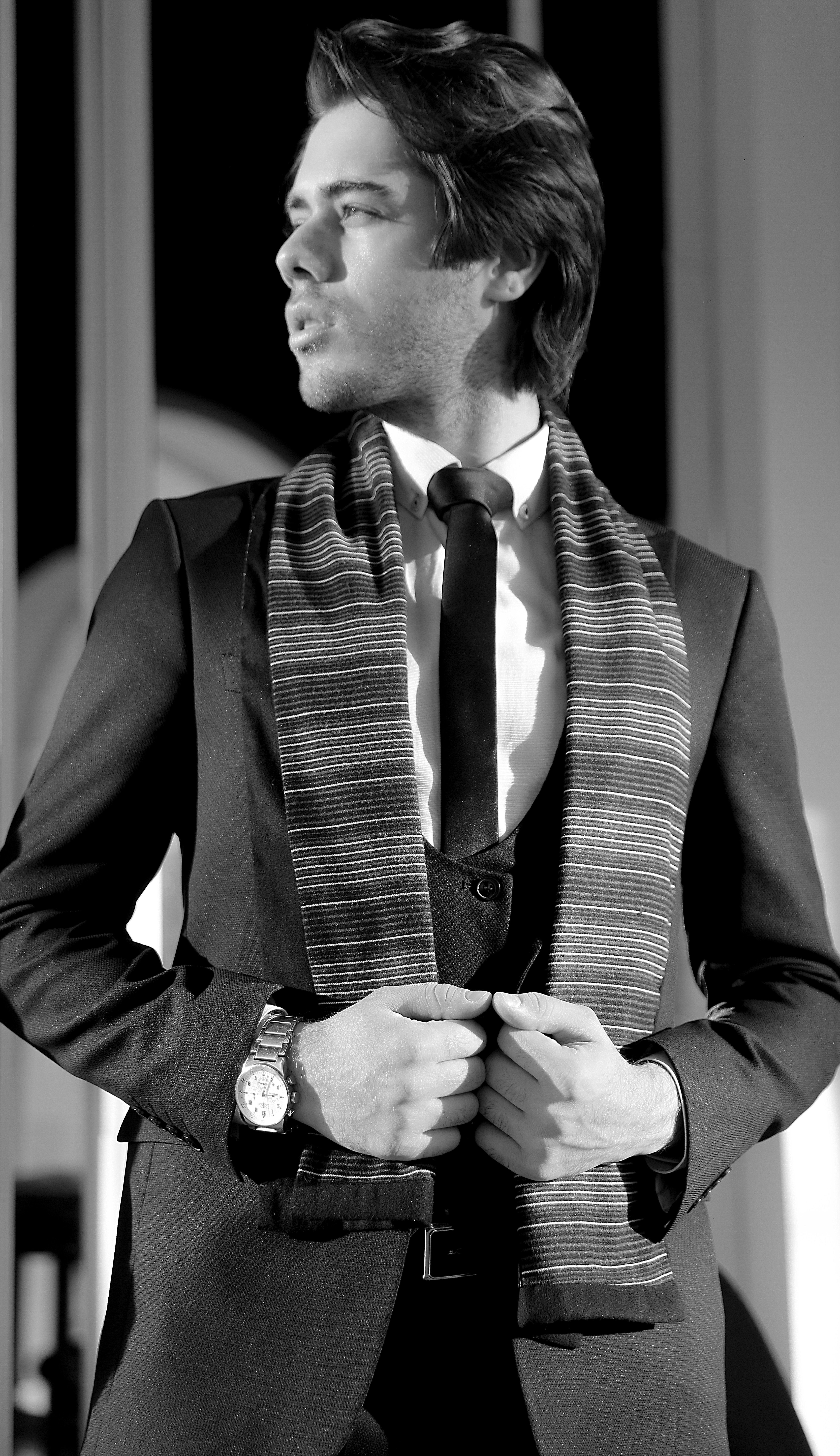 I will be grateful if
Send me your analysis on this photo. | man in black suit jacket